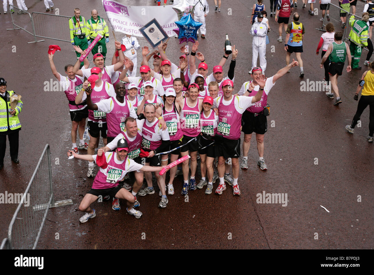 London Marathon Police runners chained together Stock Photo - Alamy