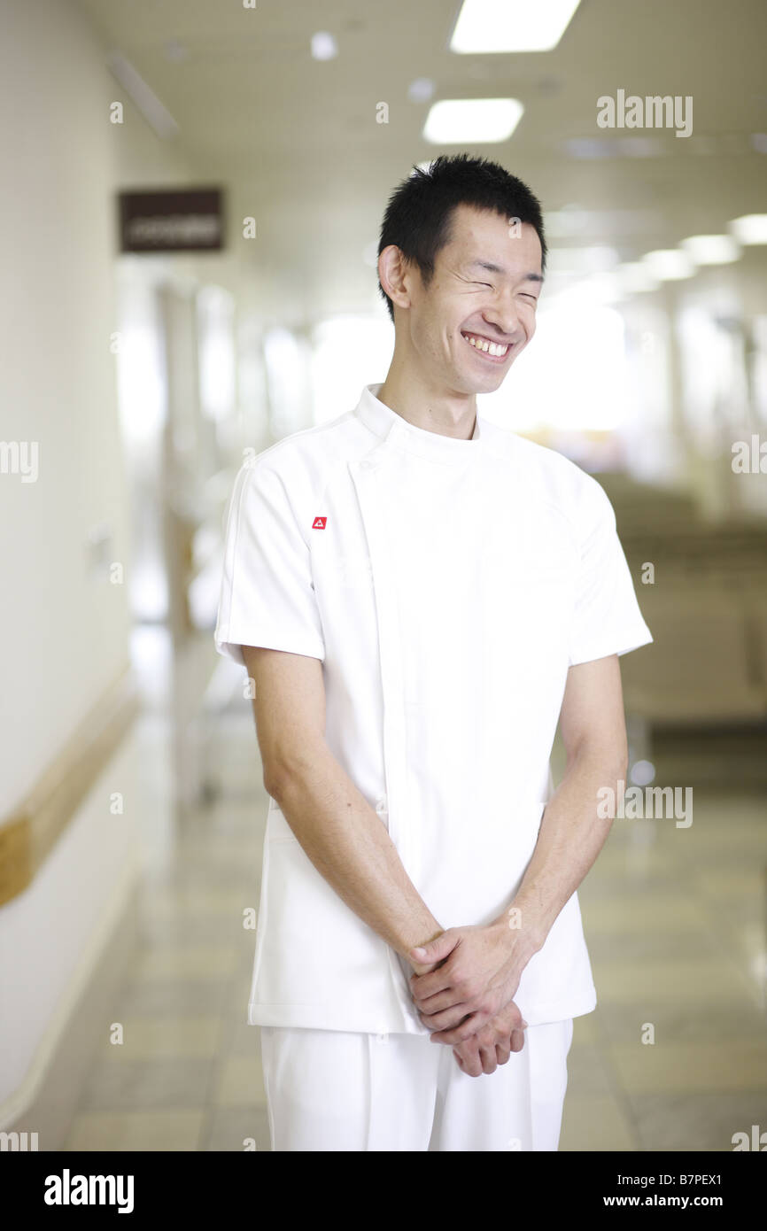 A smiling male nurse Stock Photo - Alamy