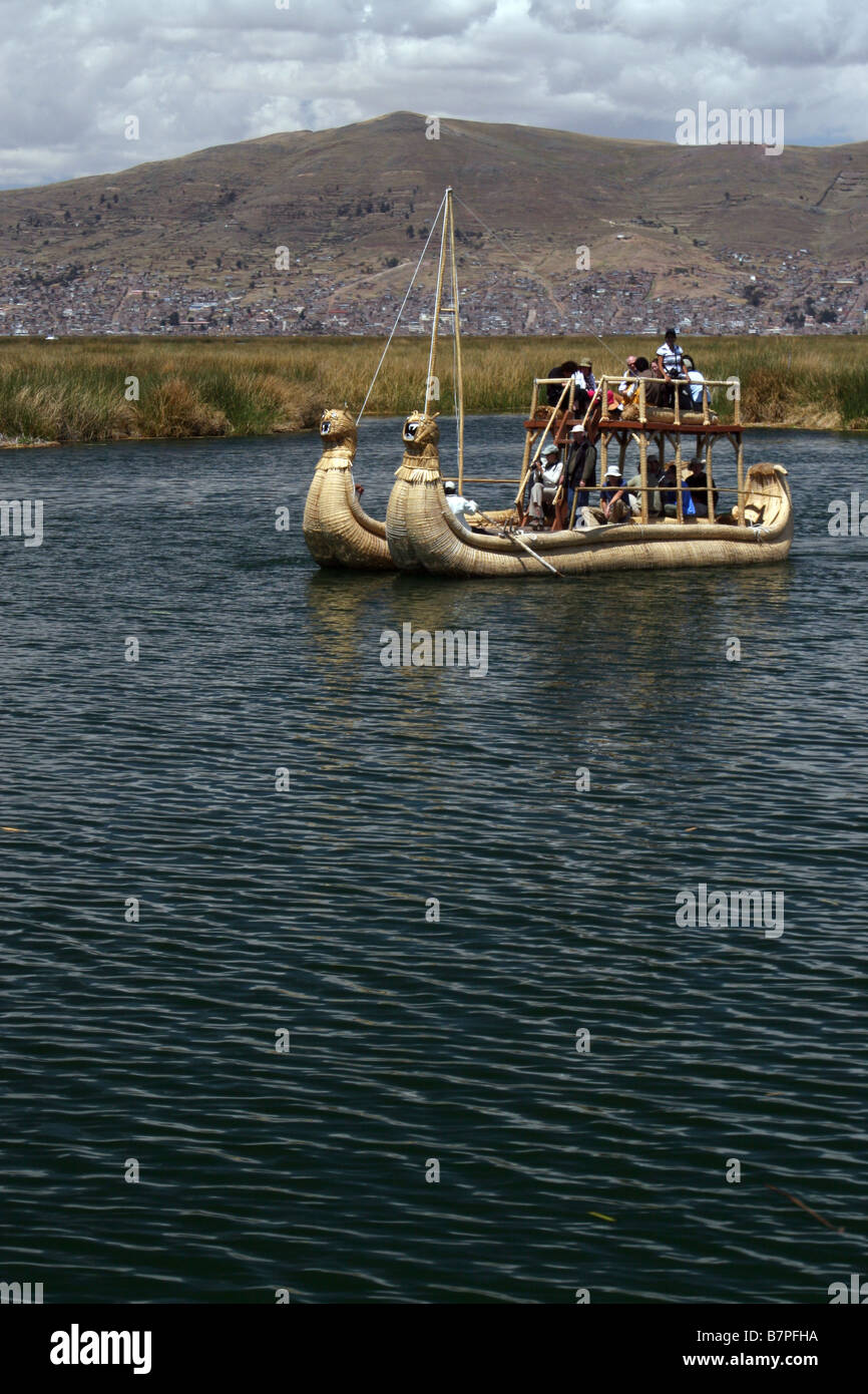 Totora-reed boat at the Uros Islands, Lake Titicaca, Peru Stock Photo ...