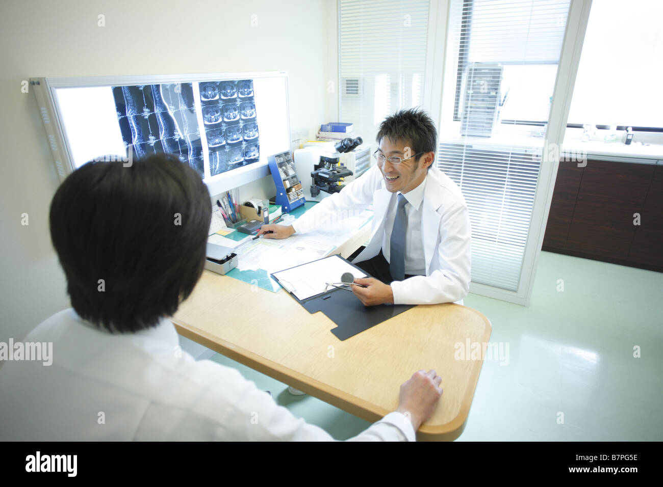 Medical examination by interview Stock Photo - Alamy