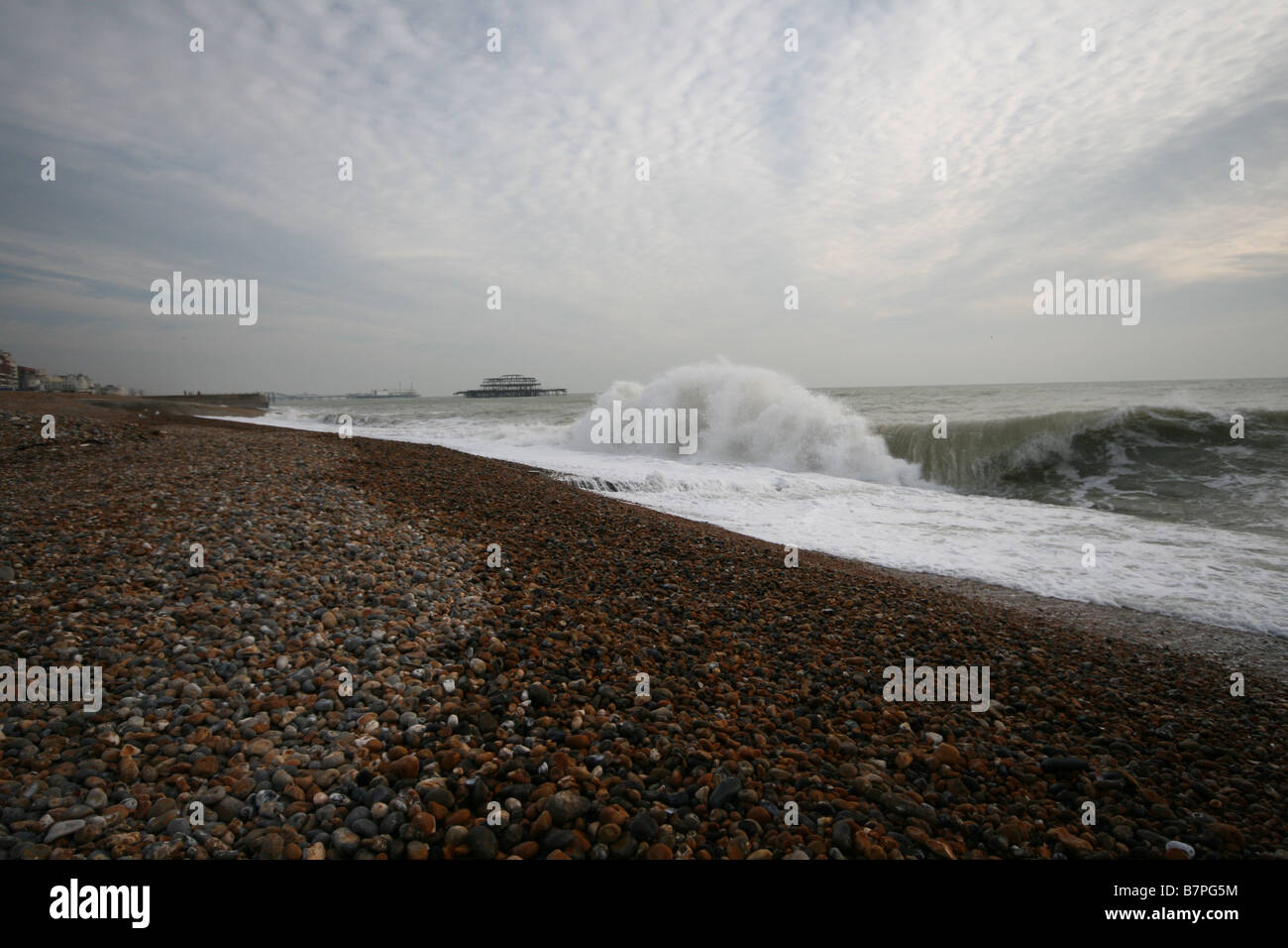 Big wave on Brighton beach Stock Photo - Alamy