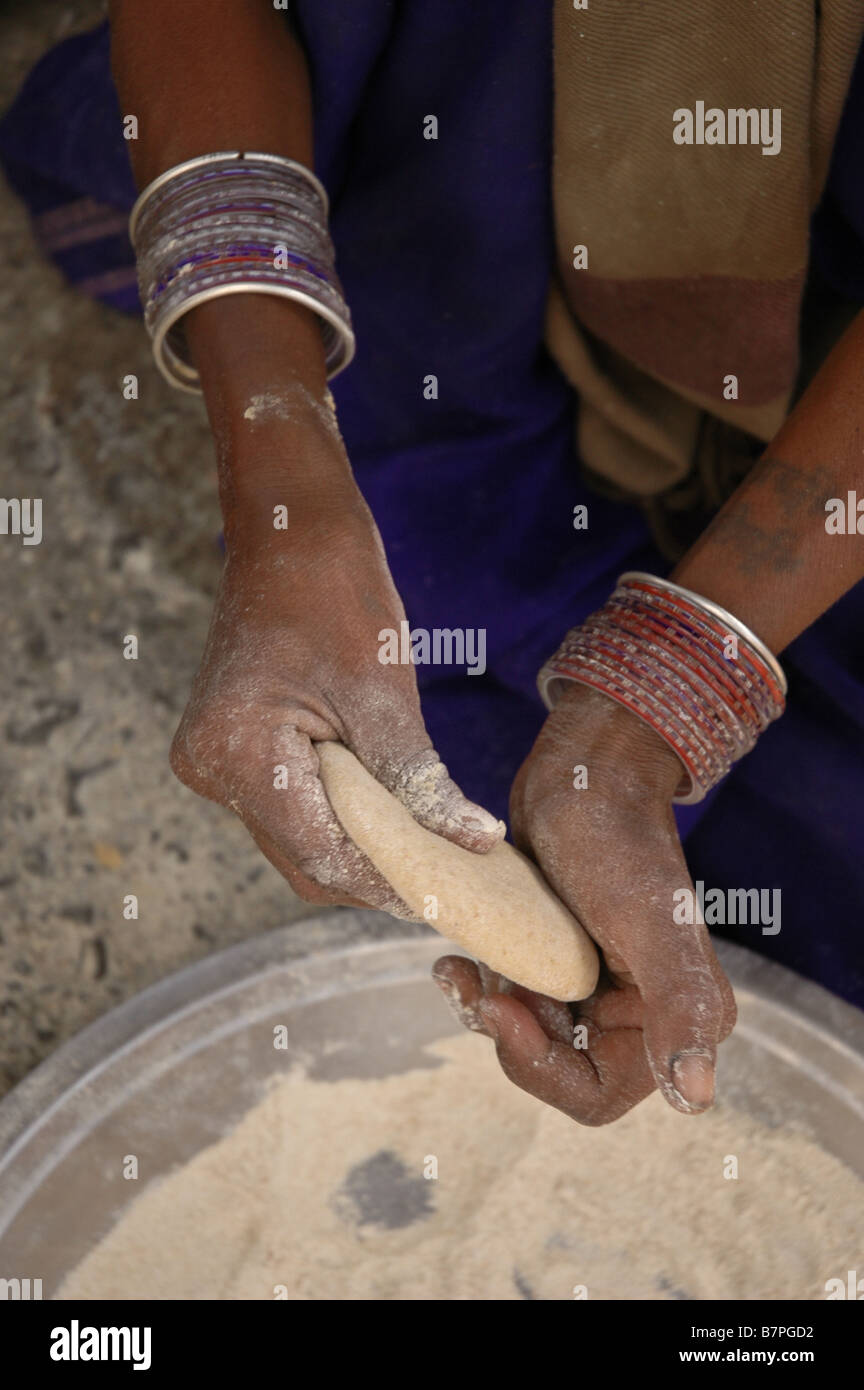 Woman cooking chapati indian bread hi-res stock photography and images ...