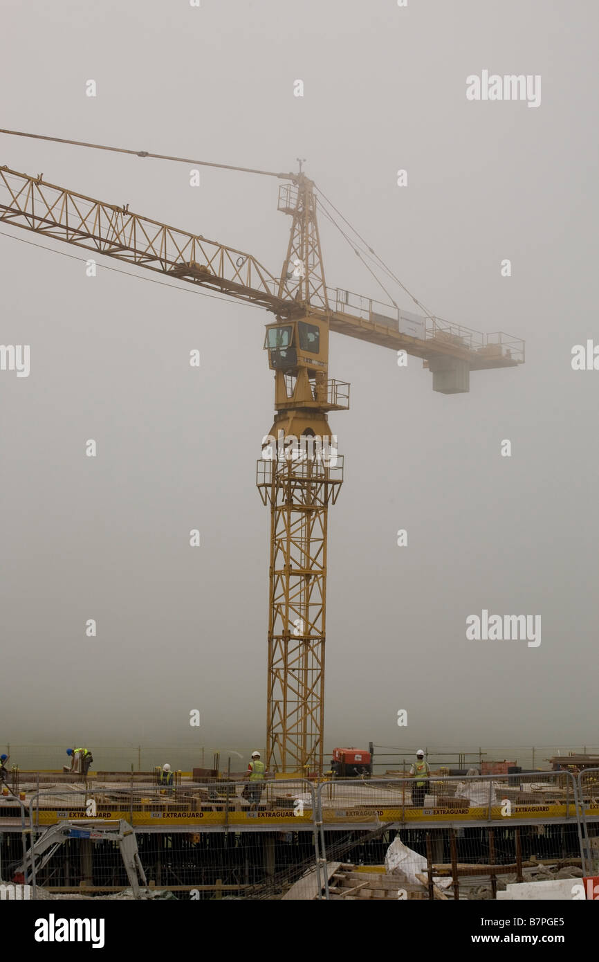 Building site Crane Fog Sea mist Structure Uk Work Stock Photo - Alamy