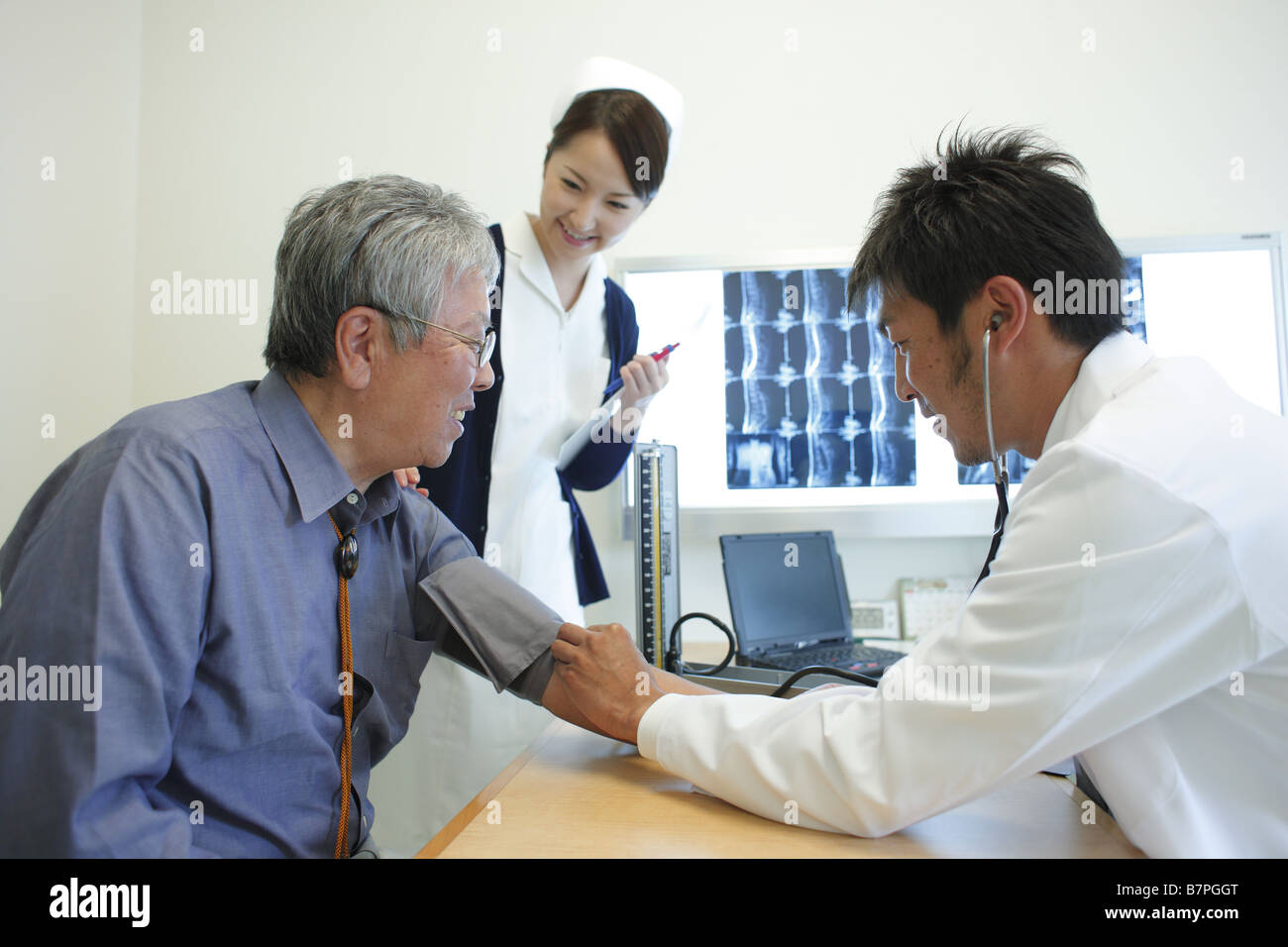 Nurses Taking Blood Pressure Patient High Resolution Stock Photography ...