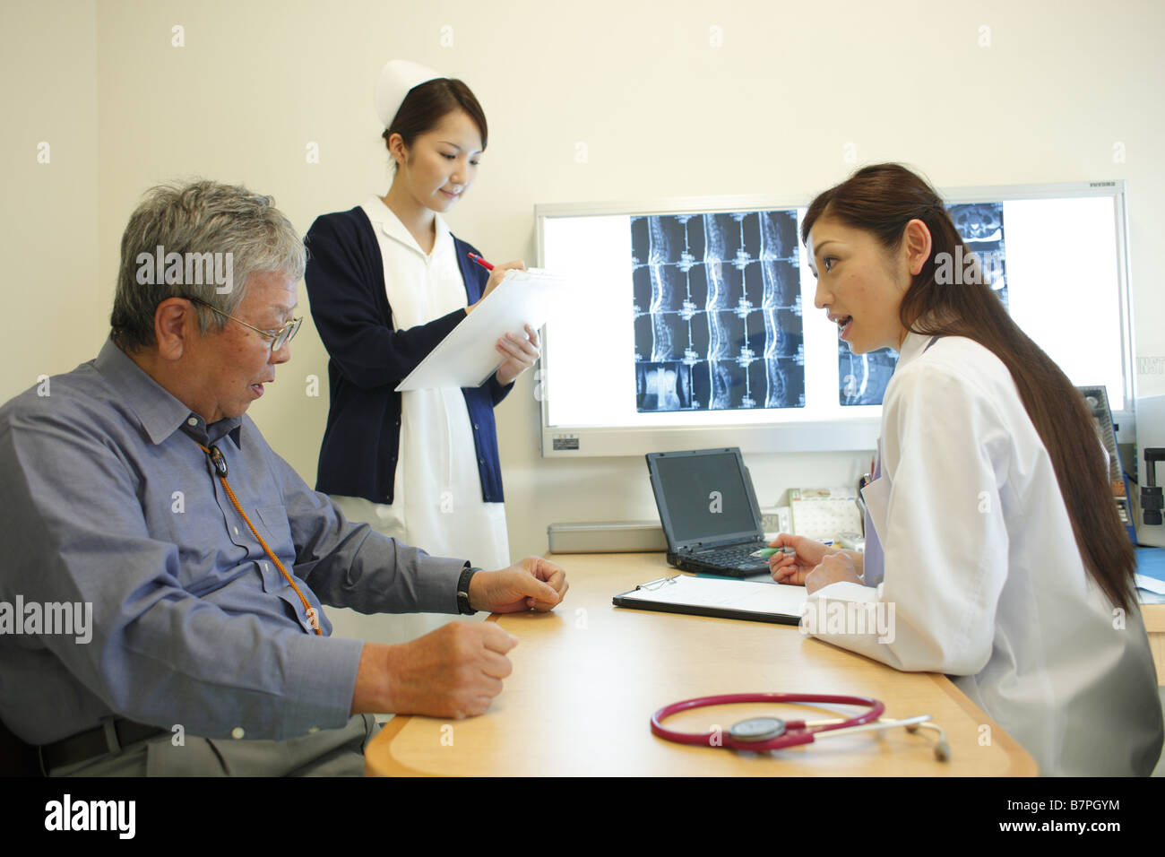 Medical examination by interview Stock Photo - Alamy