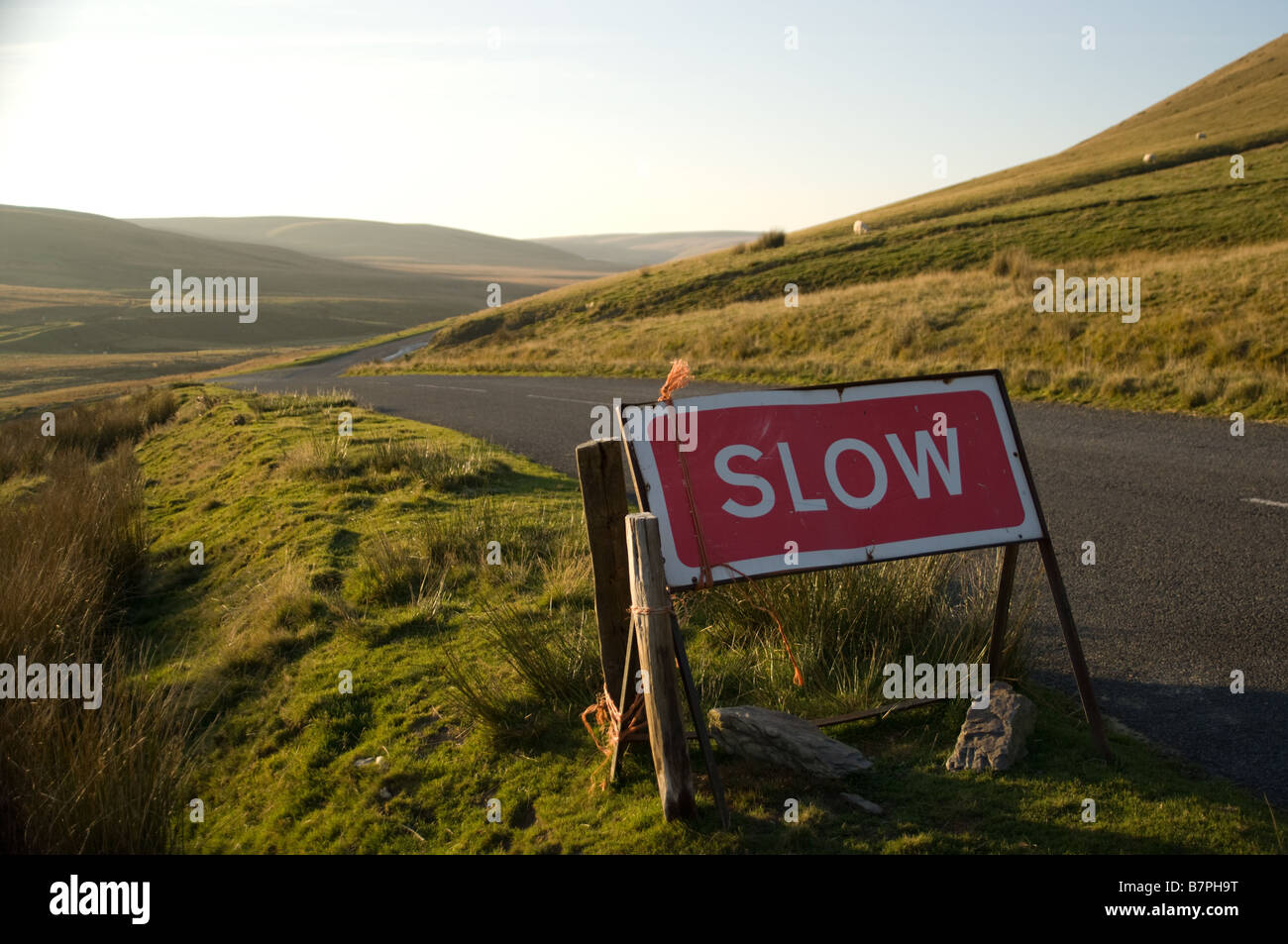 Slow road sign uk hi-res stock photography and images - Alamy