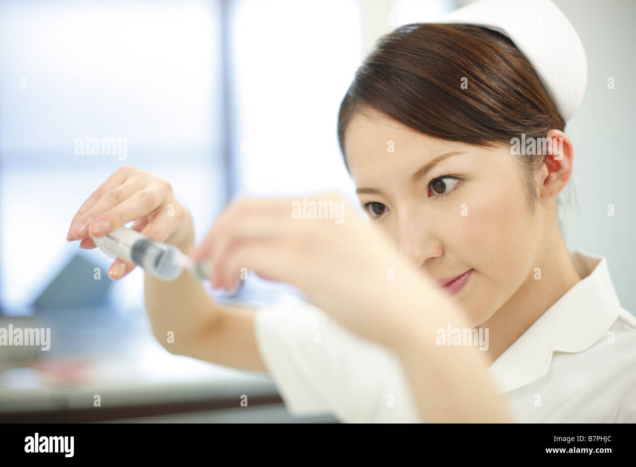 Nurse preparing for injection Stock Photo - Alamy