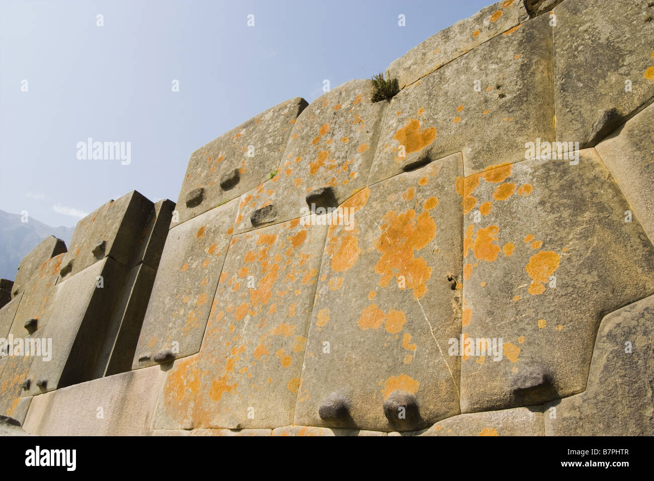 A large stone wall at the fortress of Ollantaytambo, Sacred Valley ...