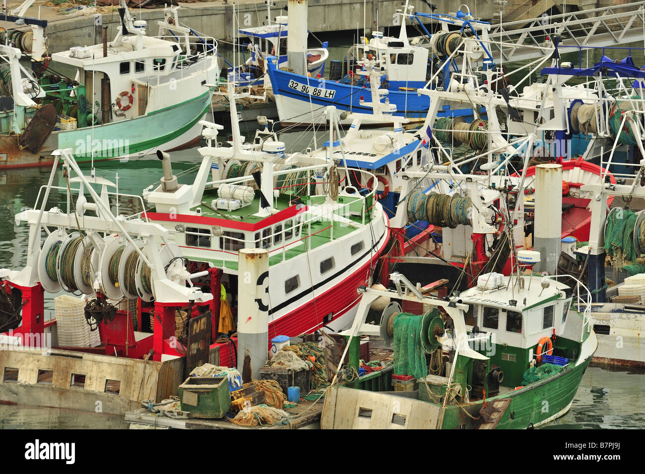 Fishing boats in harbour Stock Photo - Alamy