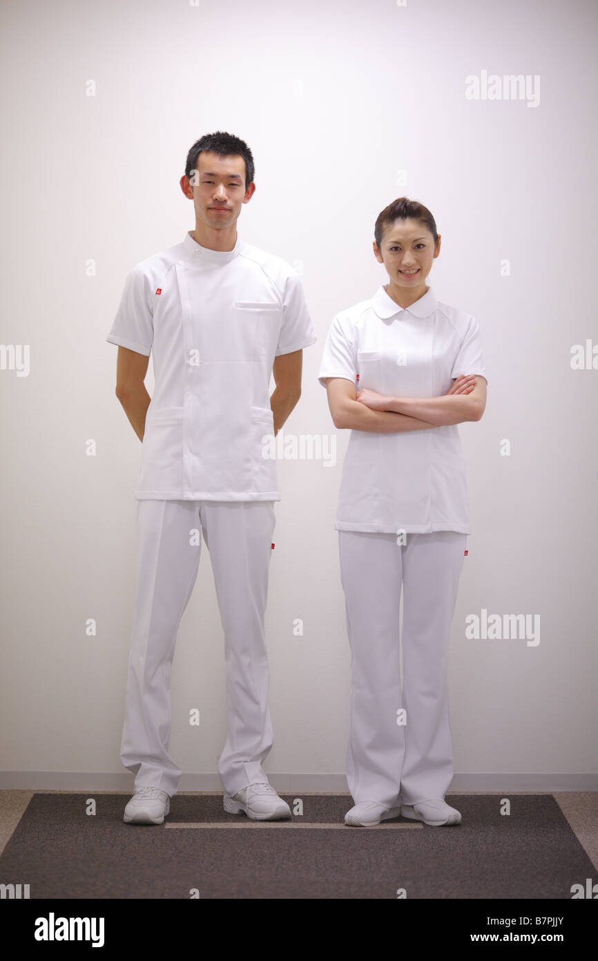 Nurse folding arms standing hi-res stock photography and images - Alamy
