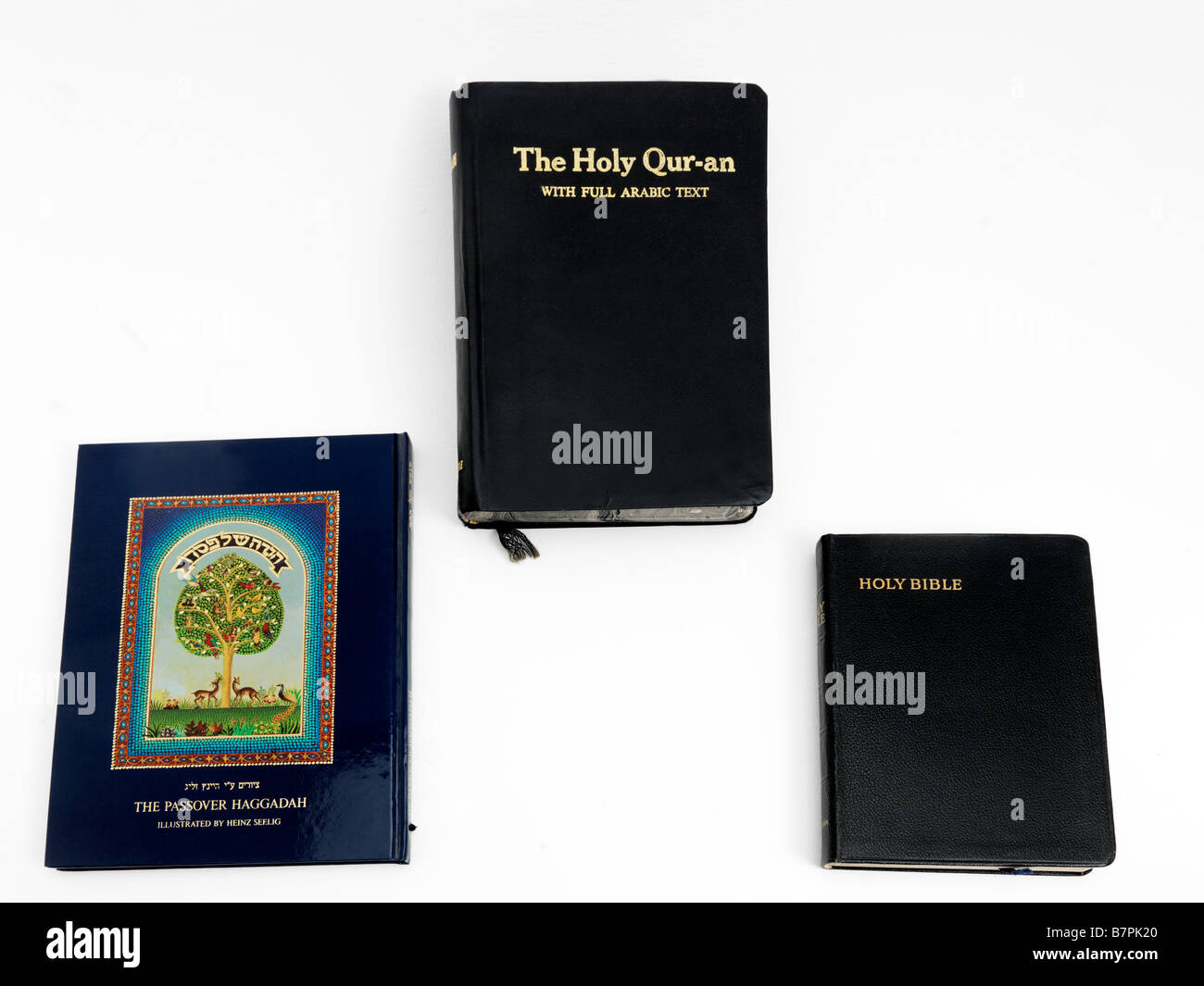 Quran and bible books hi-res stock photography and images - Alamy