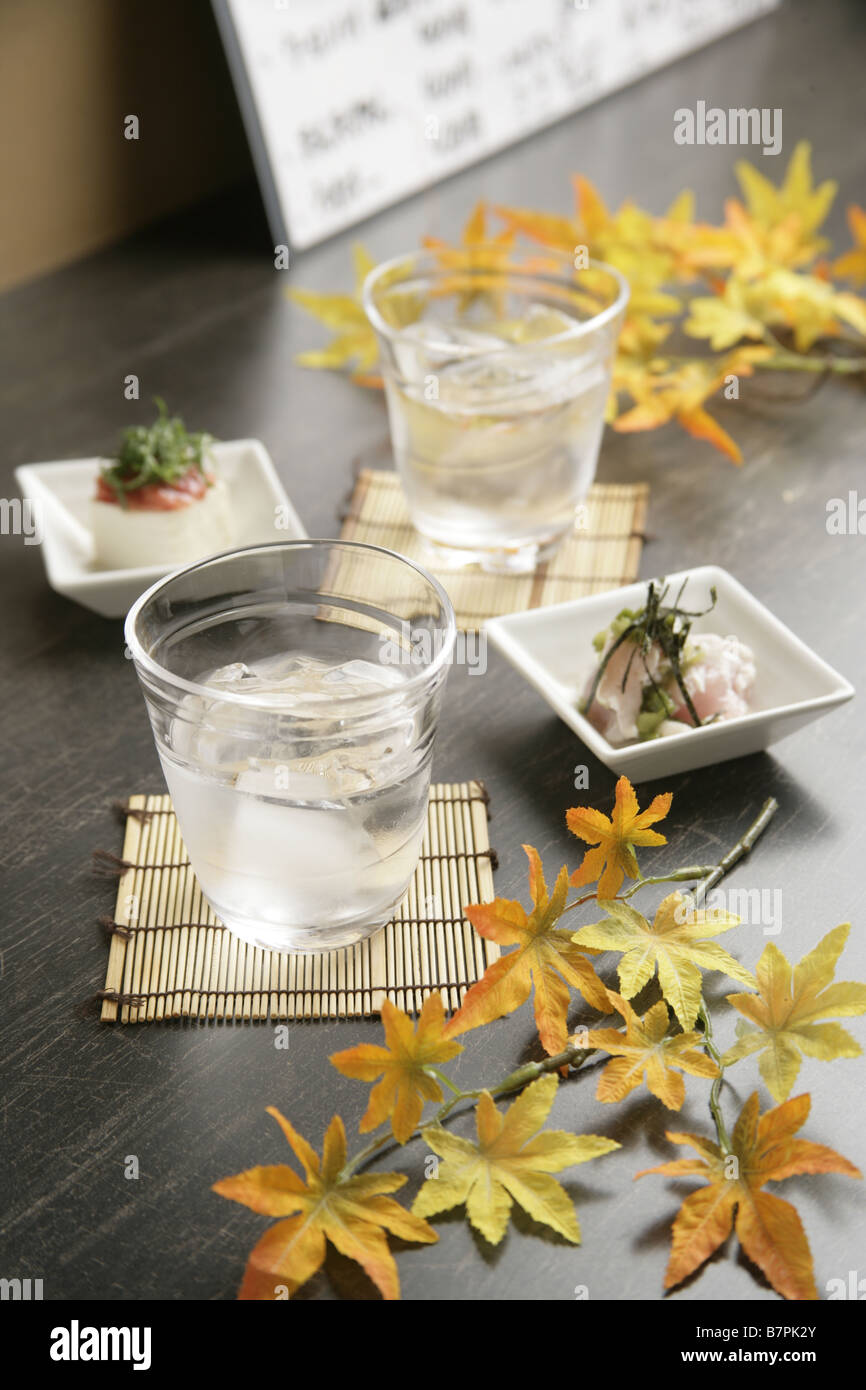 Cold sake and appetizer Stock Photo - Alamy