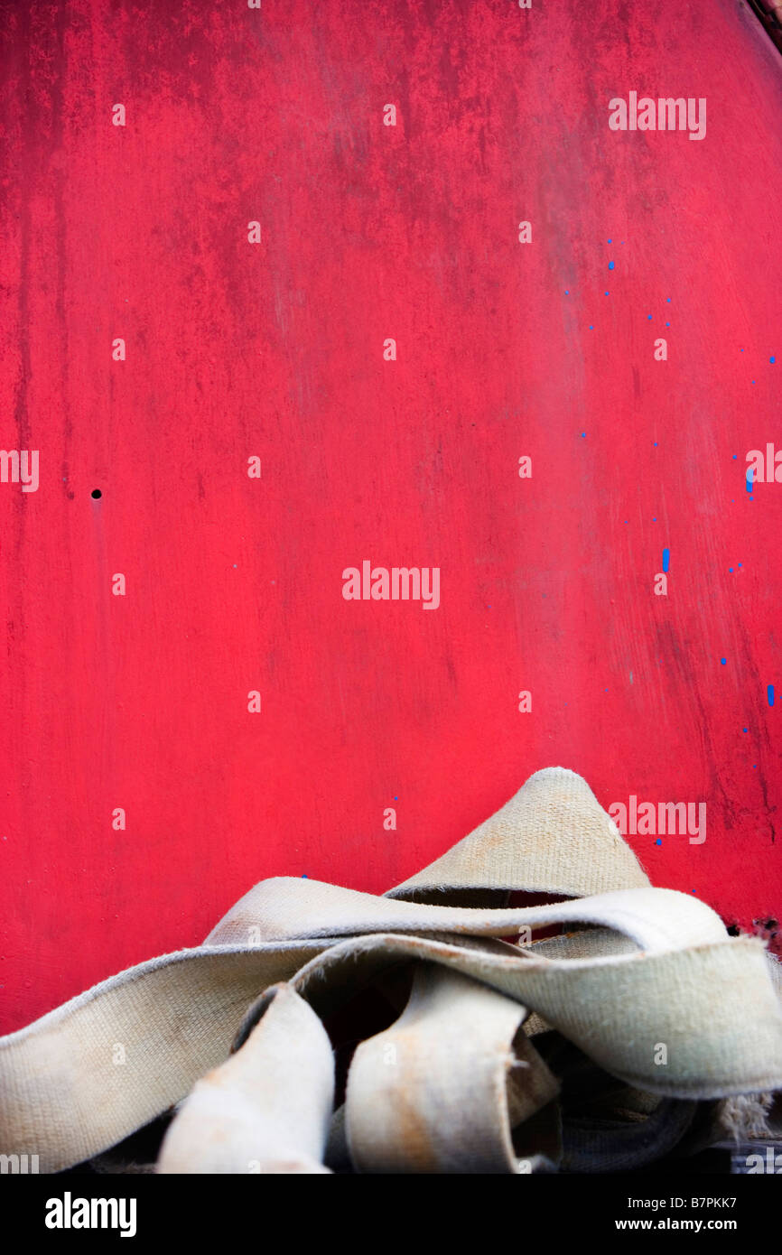OLD FIRE HOSE AND JUNK METAL Stock Photo - Alamy