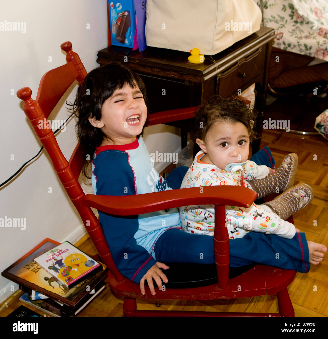 Cousins play together Stock Photo - Alamy