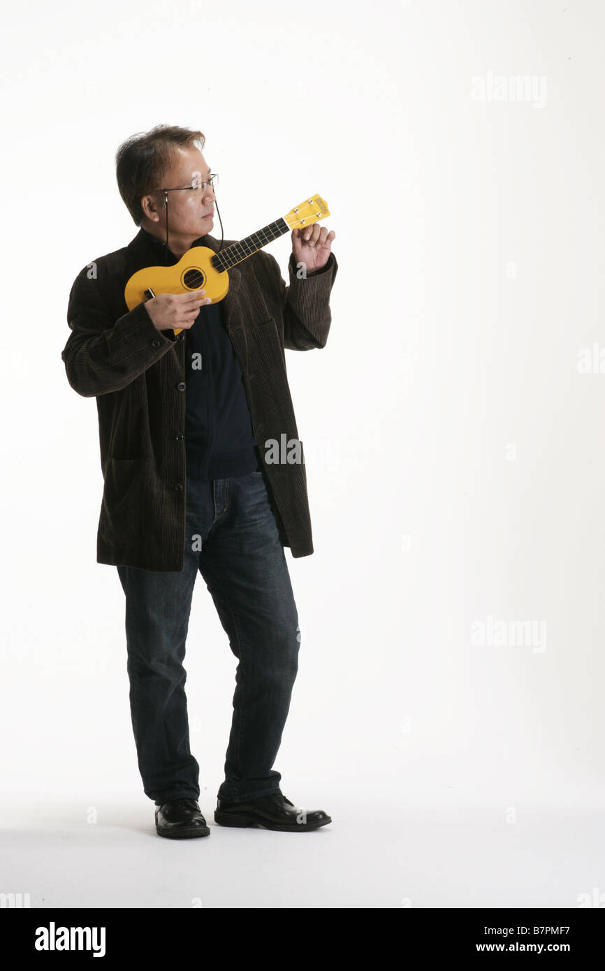 Ukulele man hi-res stock photography and images - Alamy