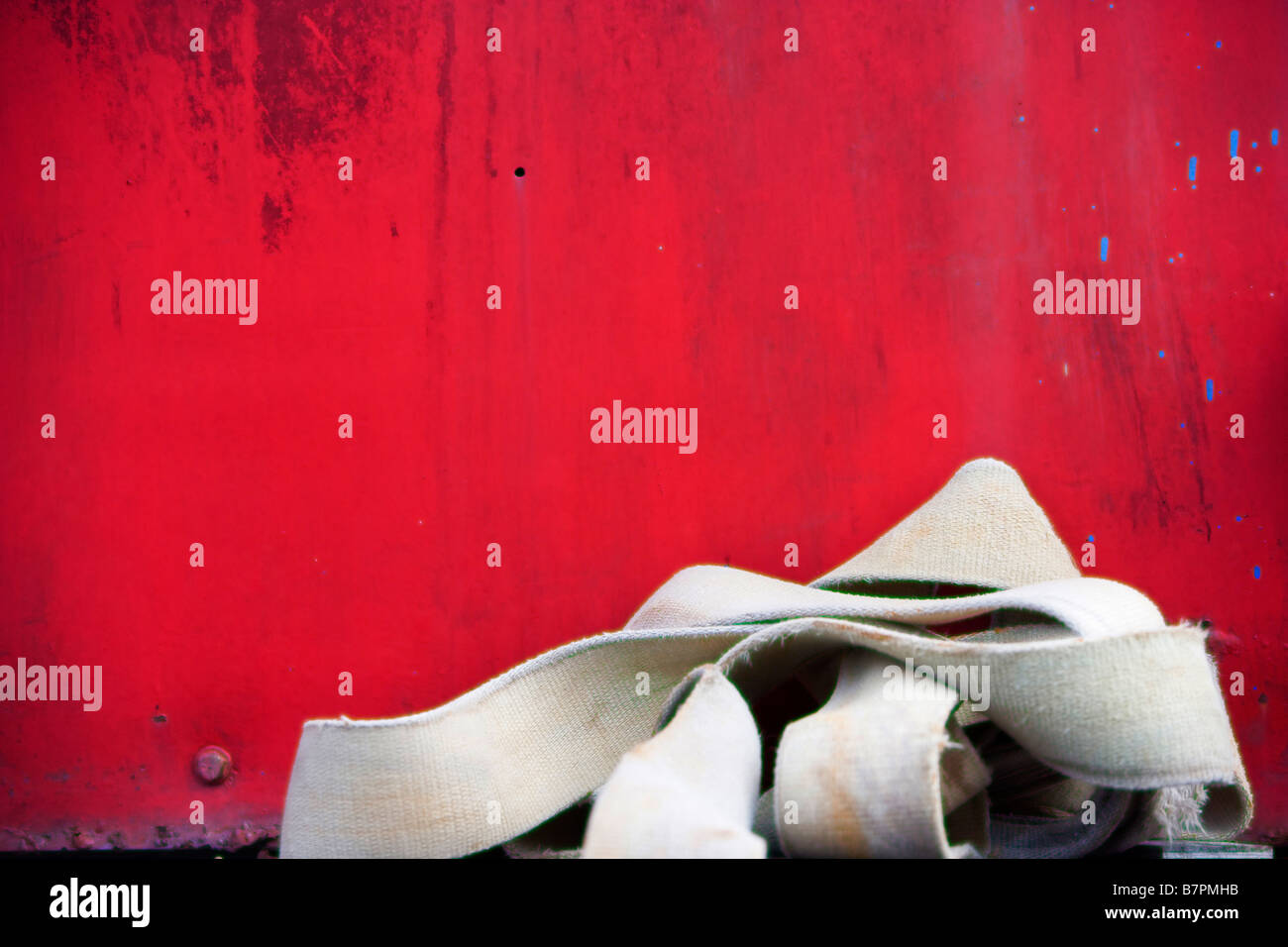 OLD FIRE HOSE AND JUNK METAL Stock Photo - Alamy