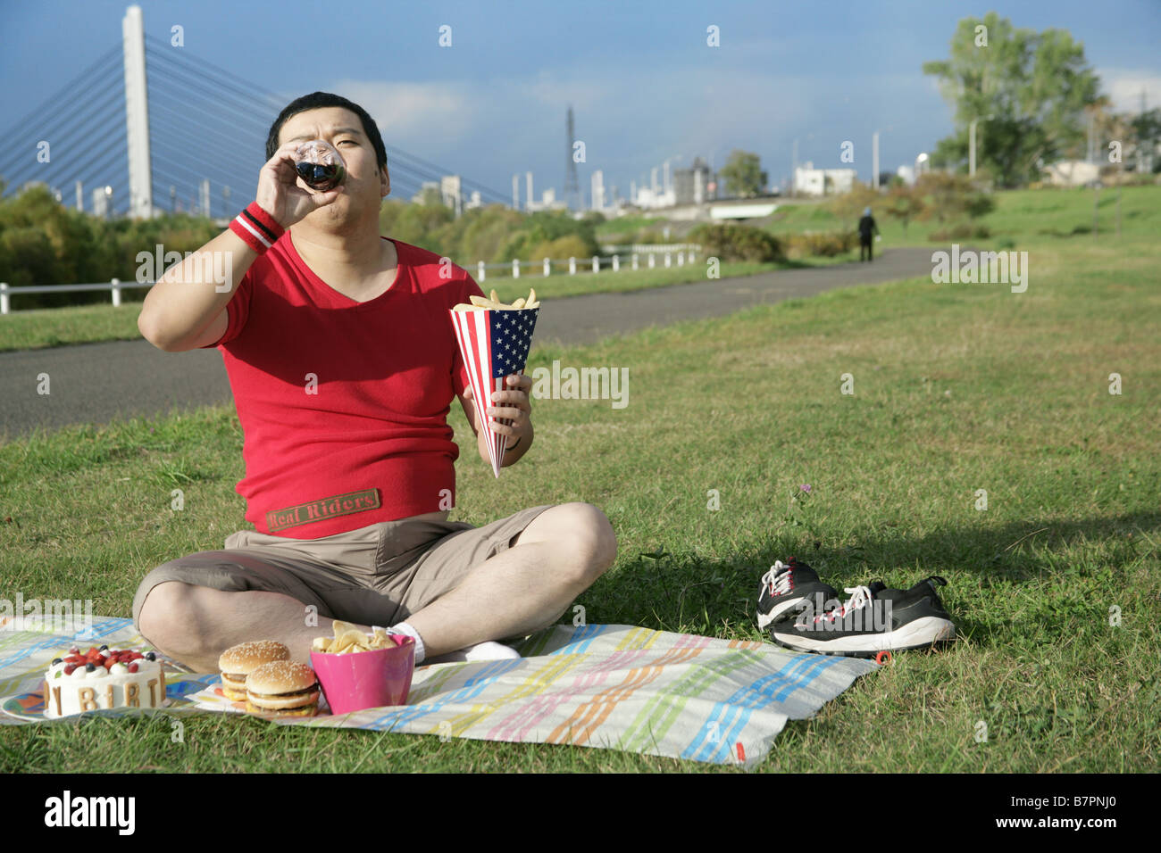 A man eating fast food Stock Photo - Alamy