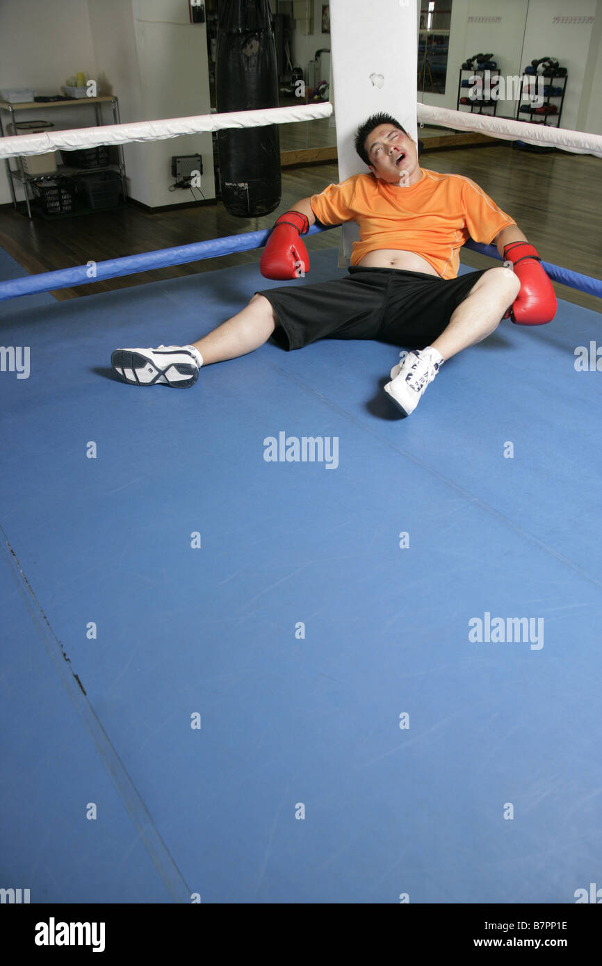 A man collapsing Stock Photo - Alamy