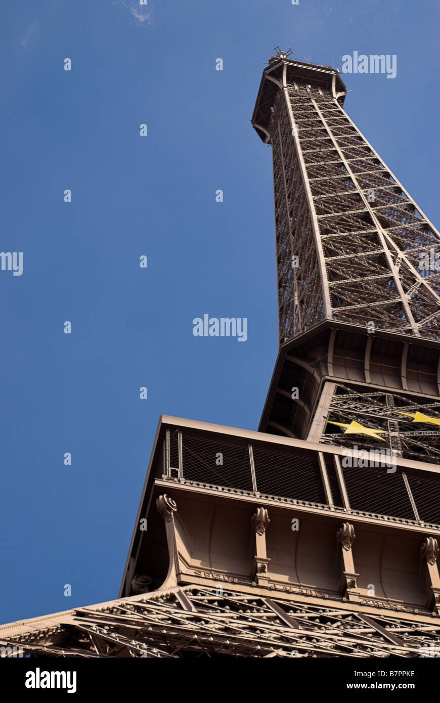 Angled view of Eiffel Tower in Paris France with European Union stars ...
