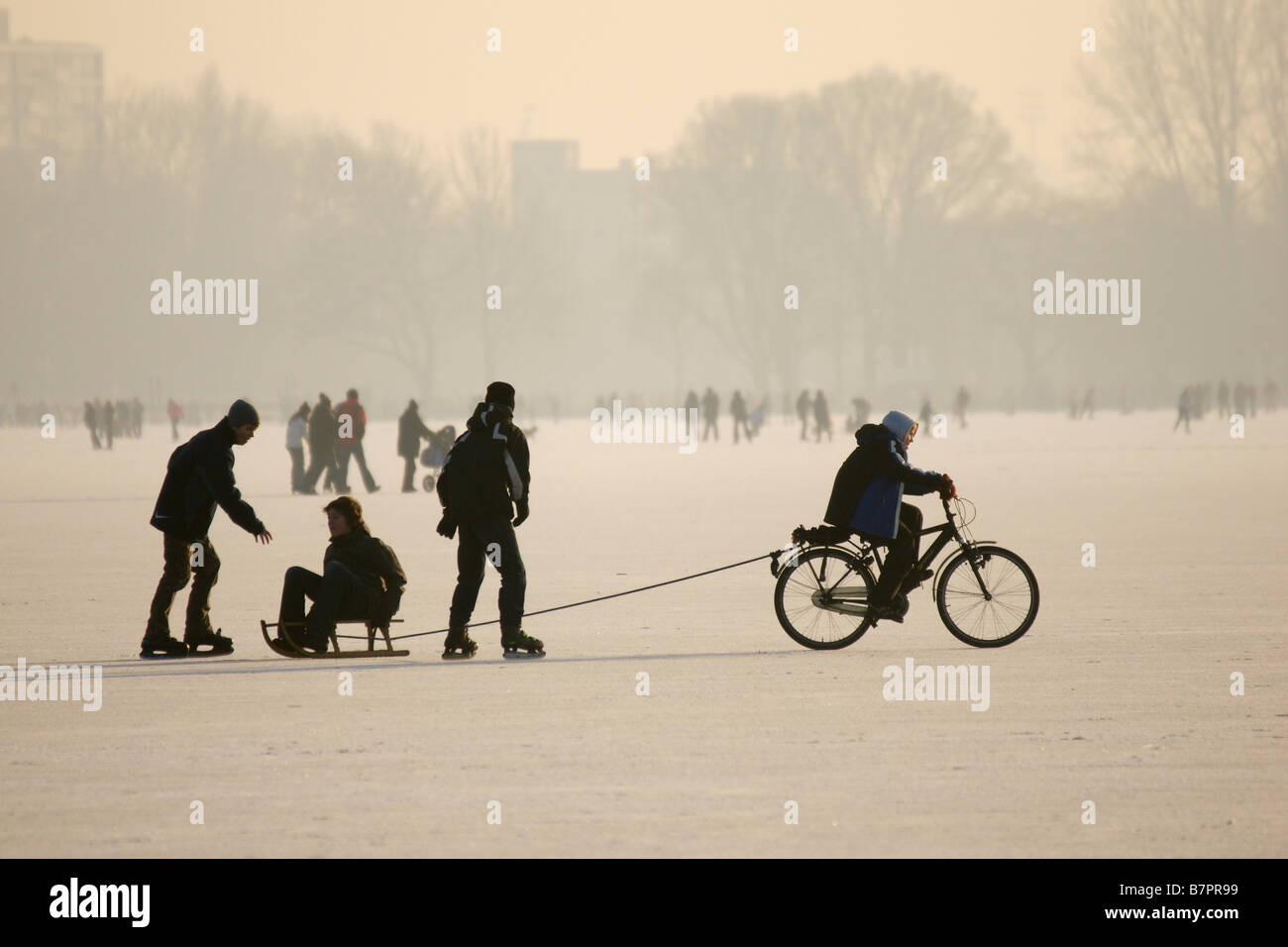 Many children crowd skating on ice at frozen Kralingse lake in ...