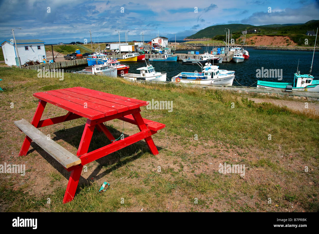 picnic table beside harbour Stock Photo - Alamy