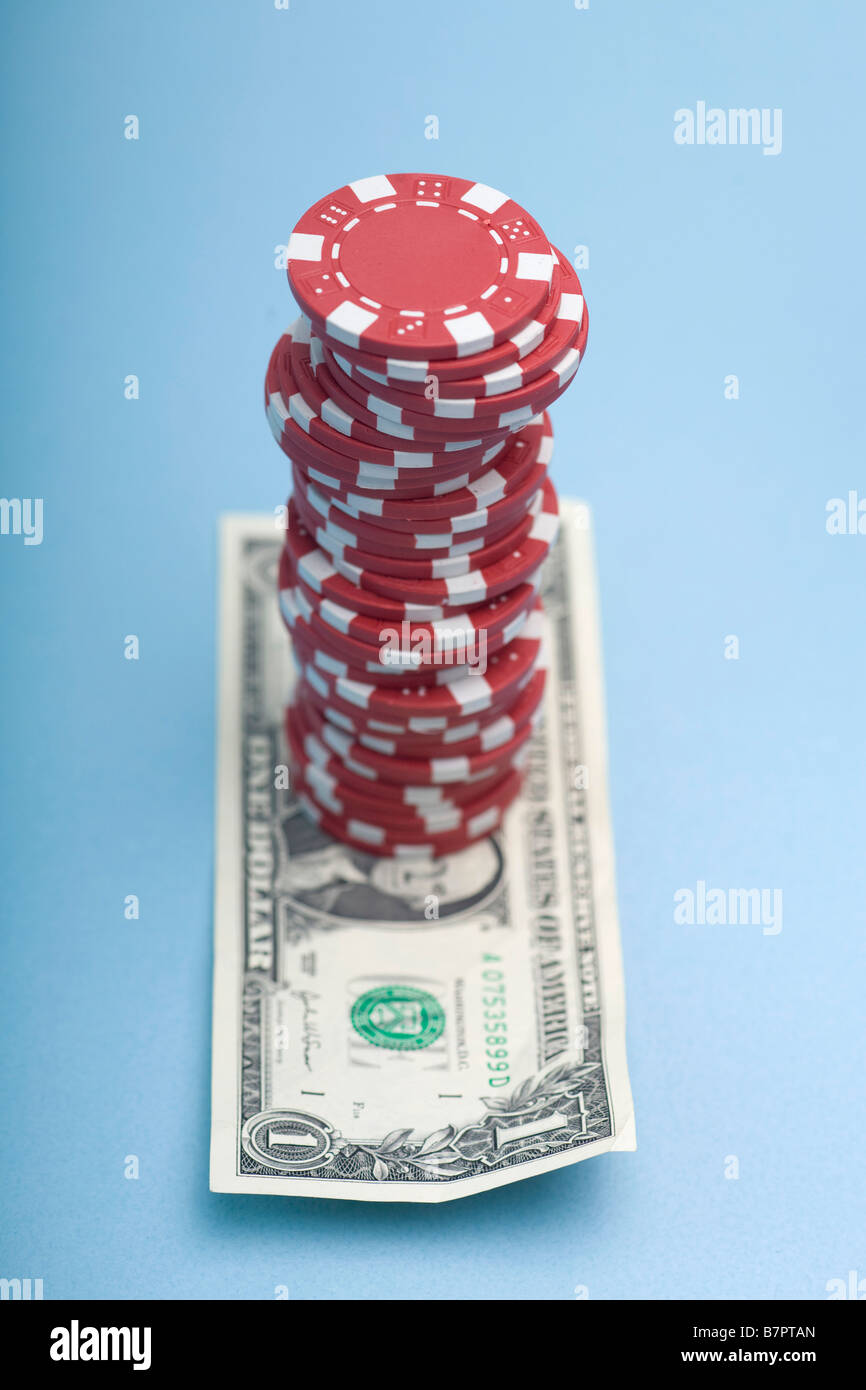 Stacks of gambling chips on one US dollar Stock Photo - Alamy