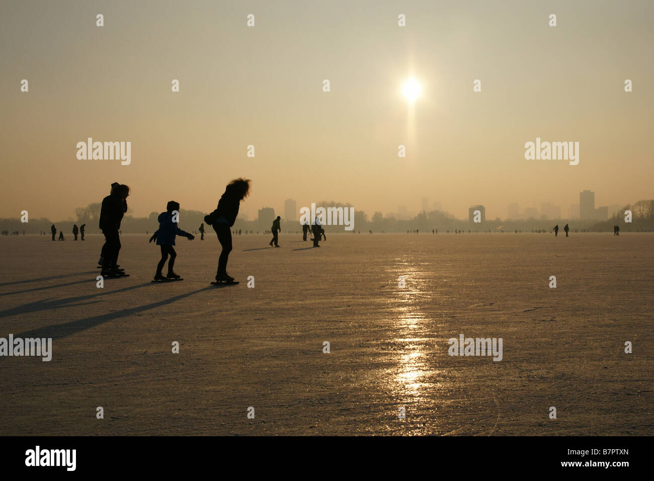 Many people crowd skating on ice at frozen Kralingse lake in Rotterdam ...