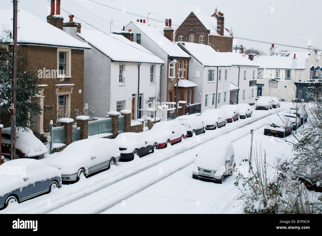 Suburban snow covered street hi-res stock photography and images - Alamy