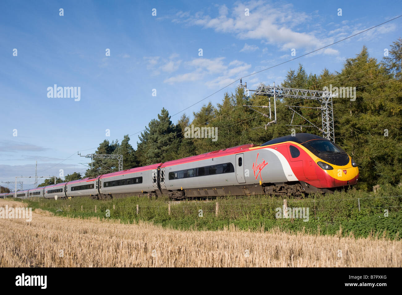 Class 390 Pendolino train speeding through the english countryside ...