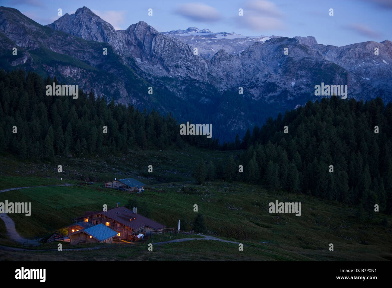 Gotzenalm lodge in moonlight and alpine panorama near Koenigssee ...