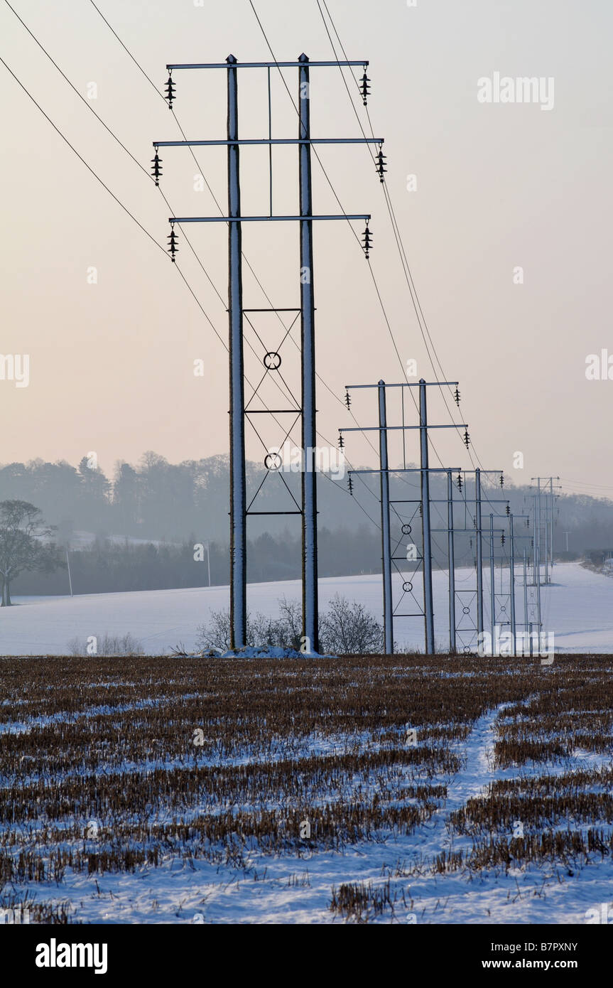 Power lines crossing farmland in winter, UK Stock Photo - Alamy
