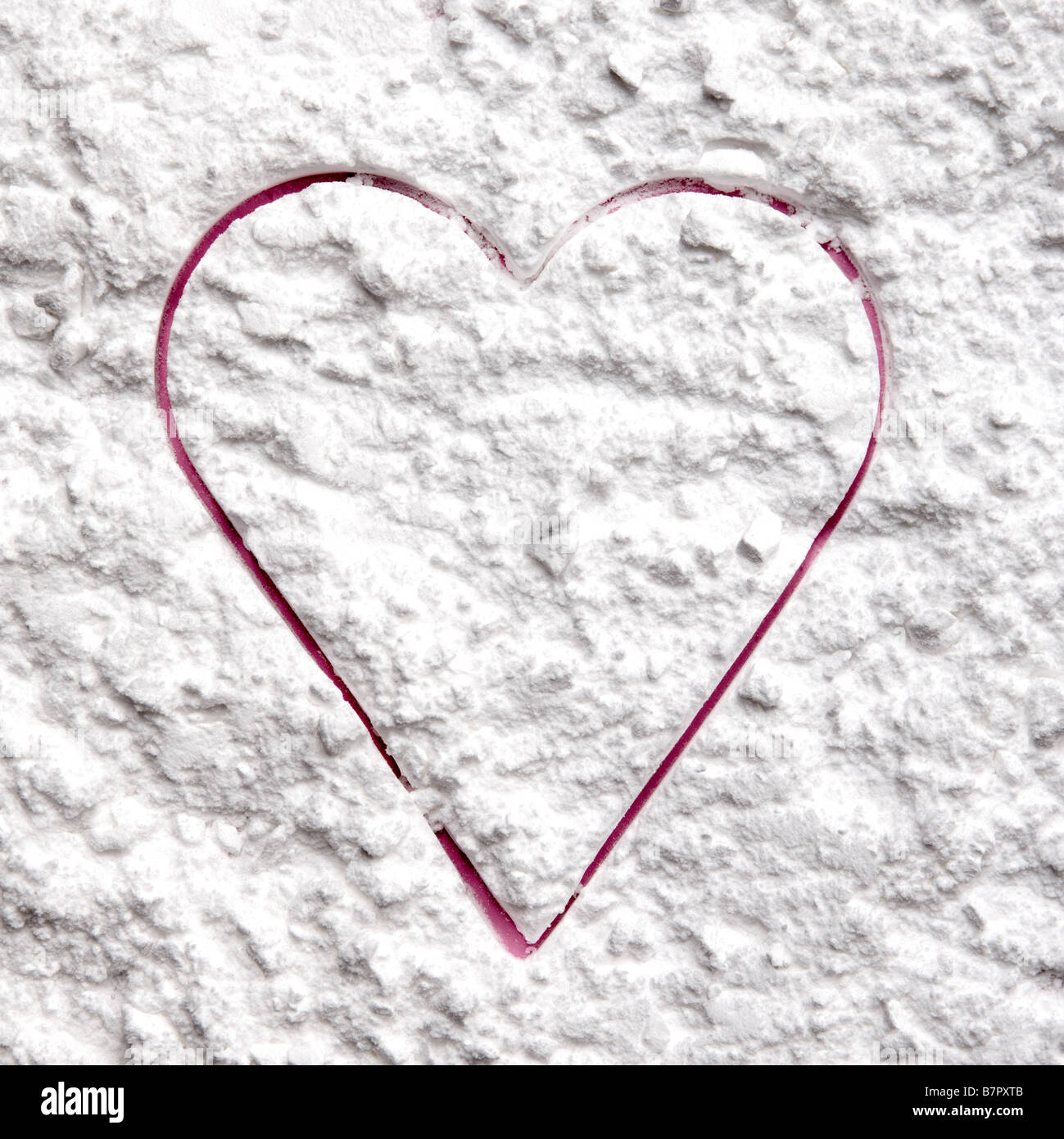 Love heart shape in icing sugar Stock Photo - Alamy