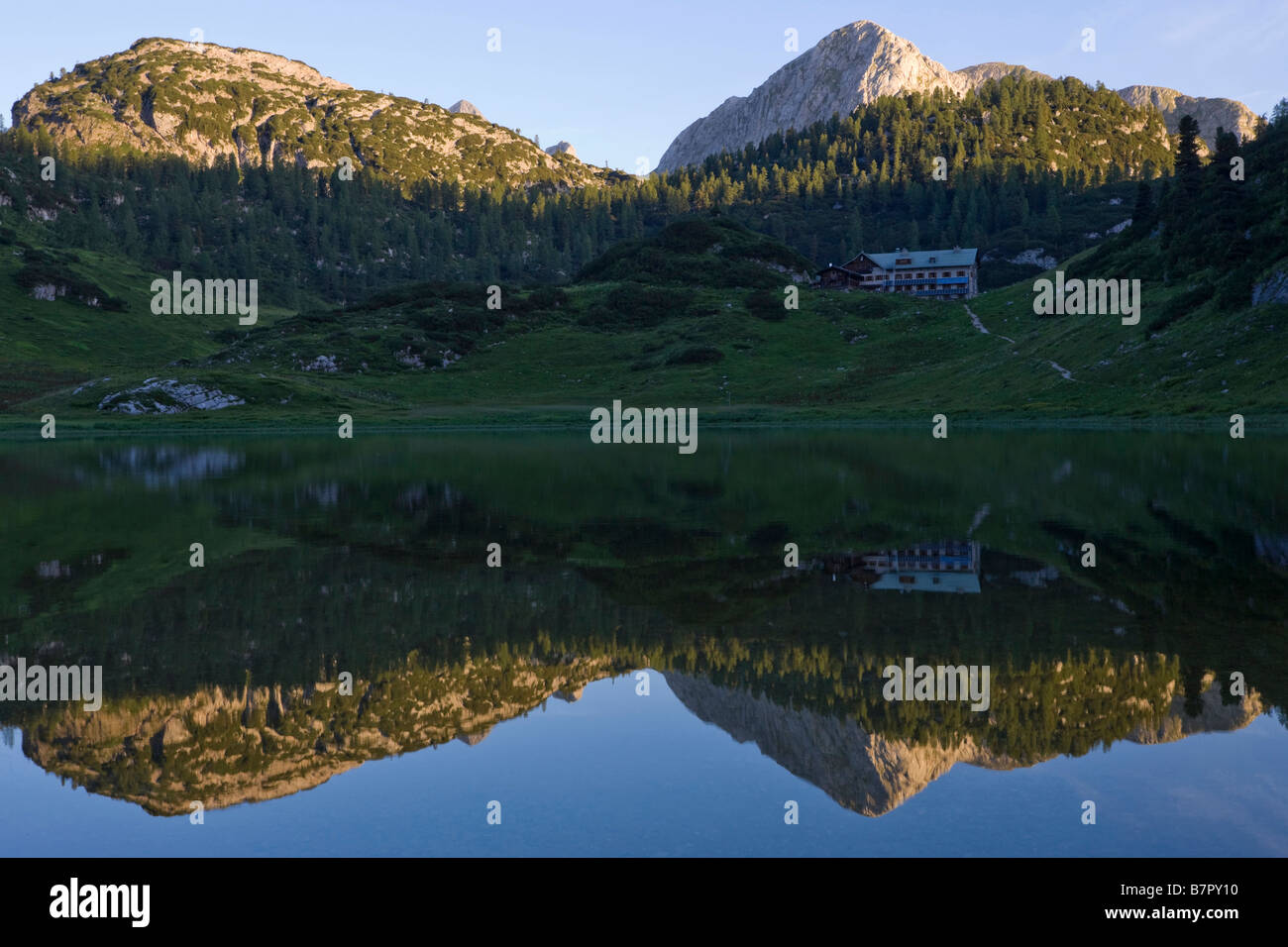 Funtensee lodge and alpine panorama reflecting in Funtensee near ...