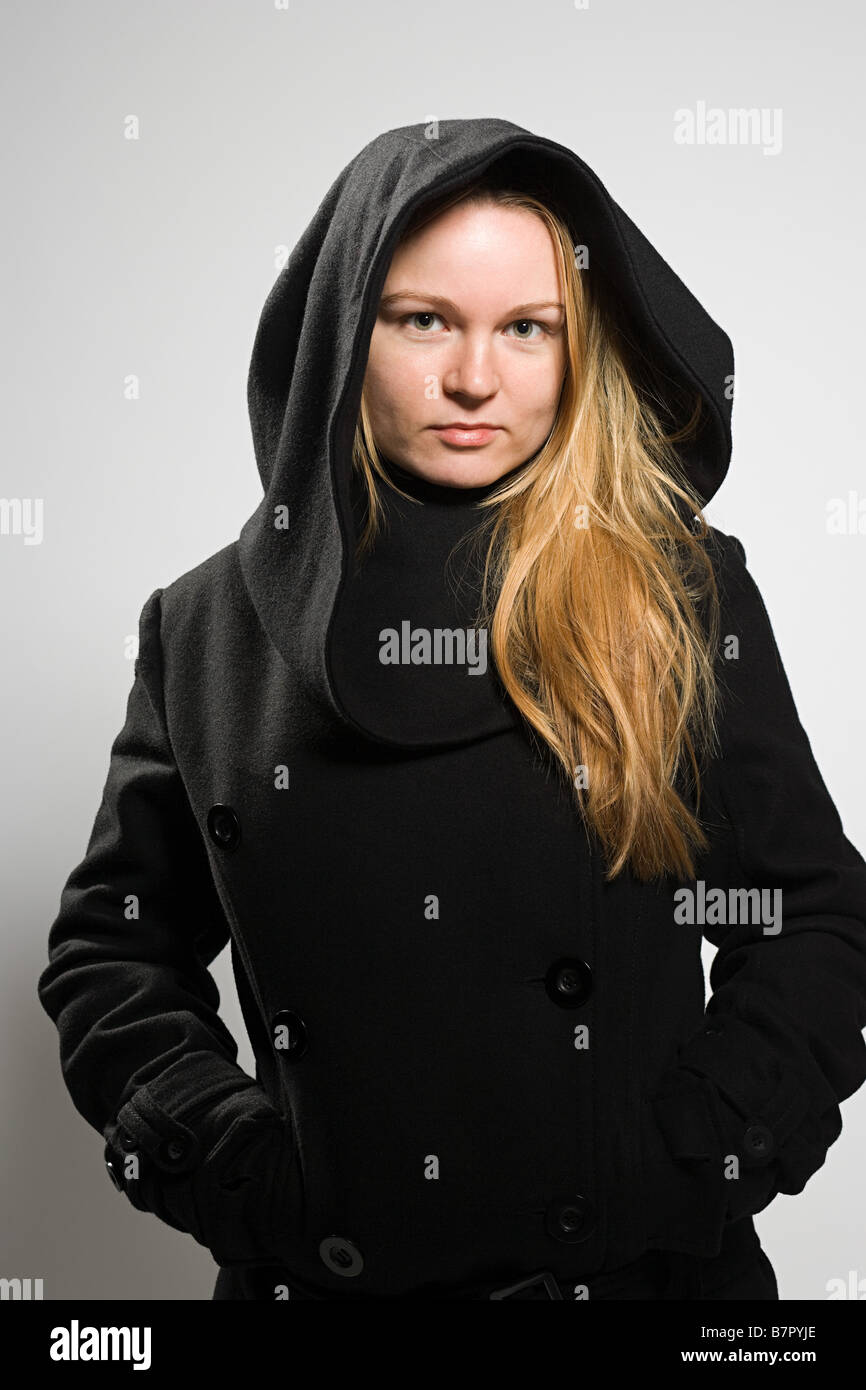 Young woman in a hood Stock Photo - Alamy