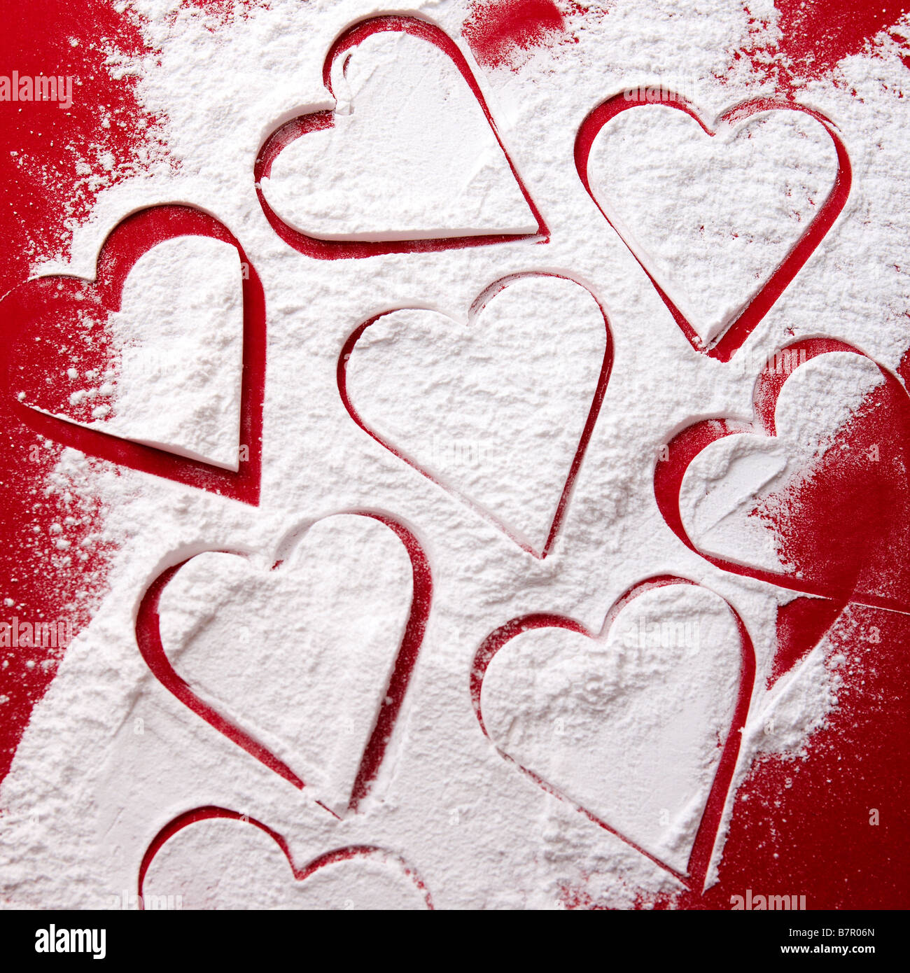 Love hearts in icing sugar Stock Photo - Alamy