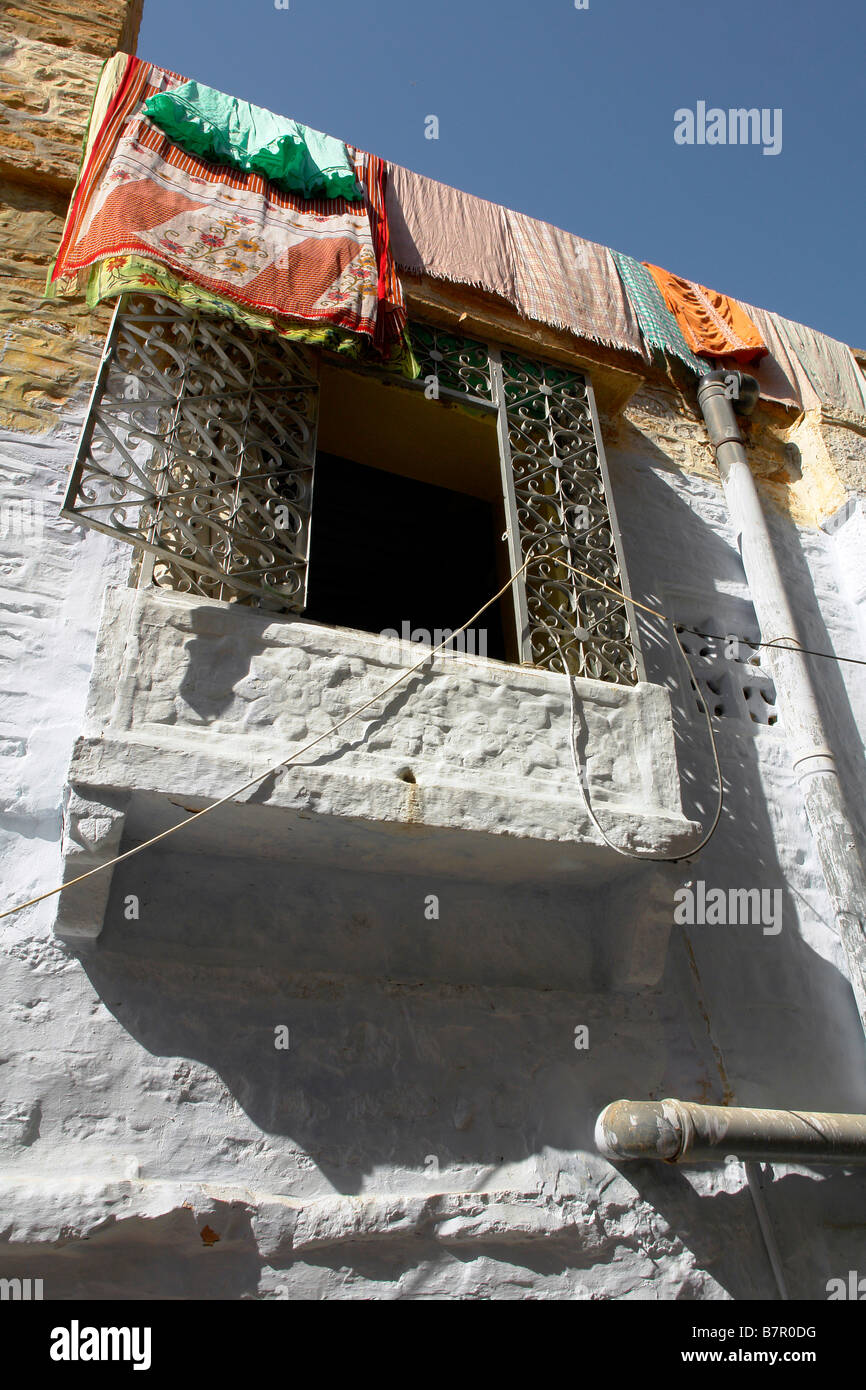 washing and traditional haveli house in the back streets of the fort of ...
