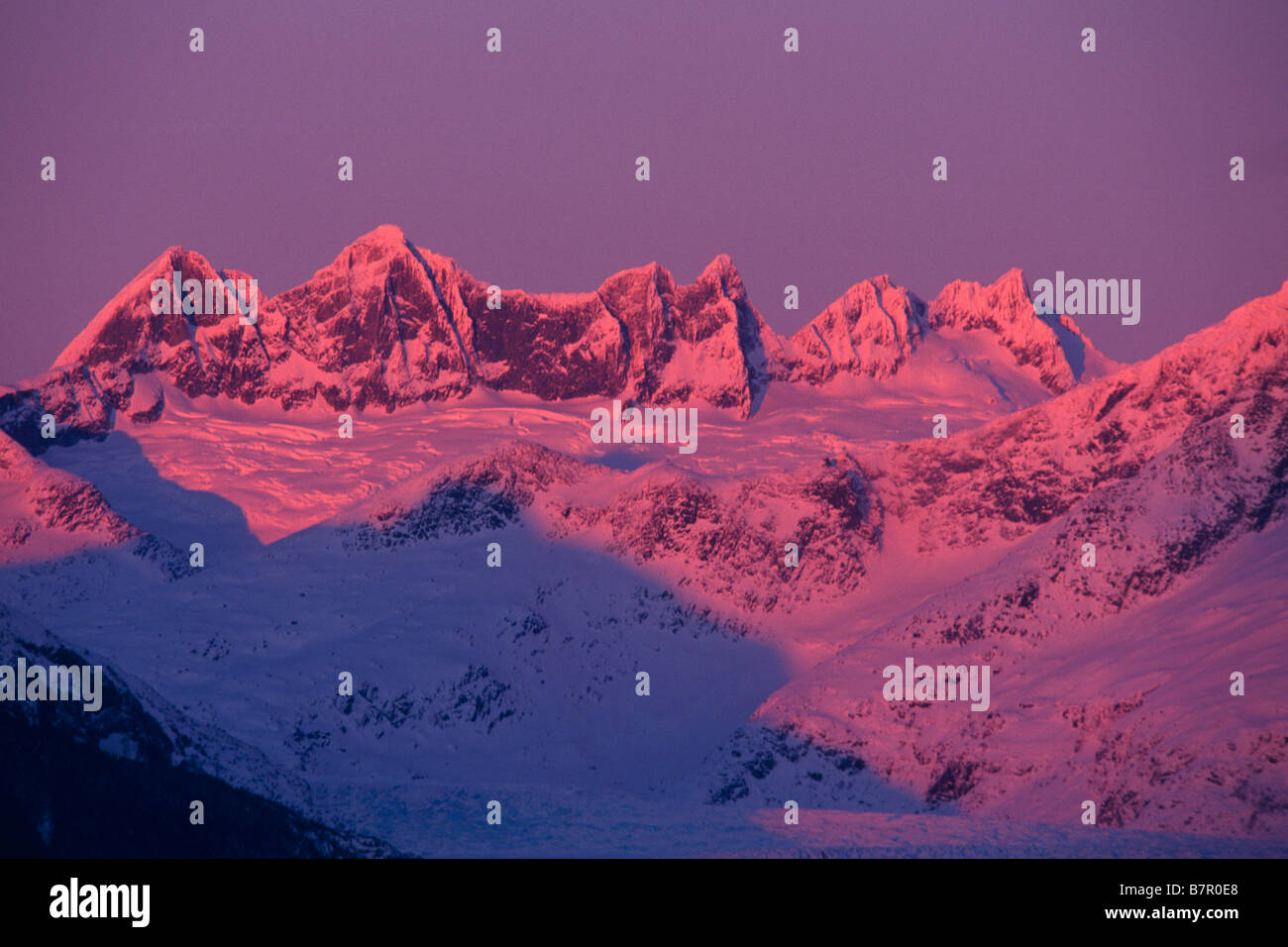 Alpenglow lights up Mendenhall Towers above the glacier @ sunrise Coast ...
