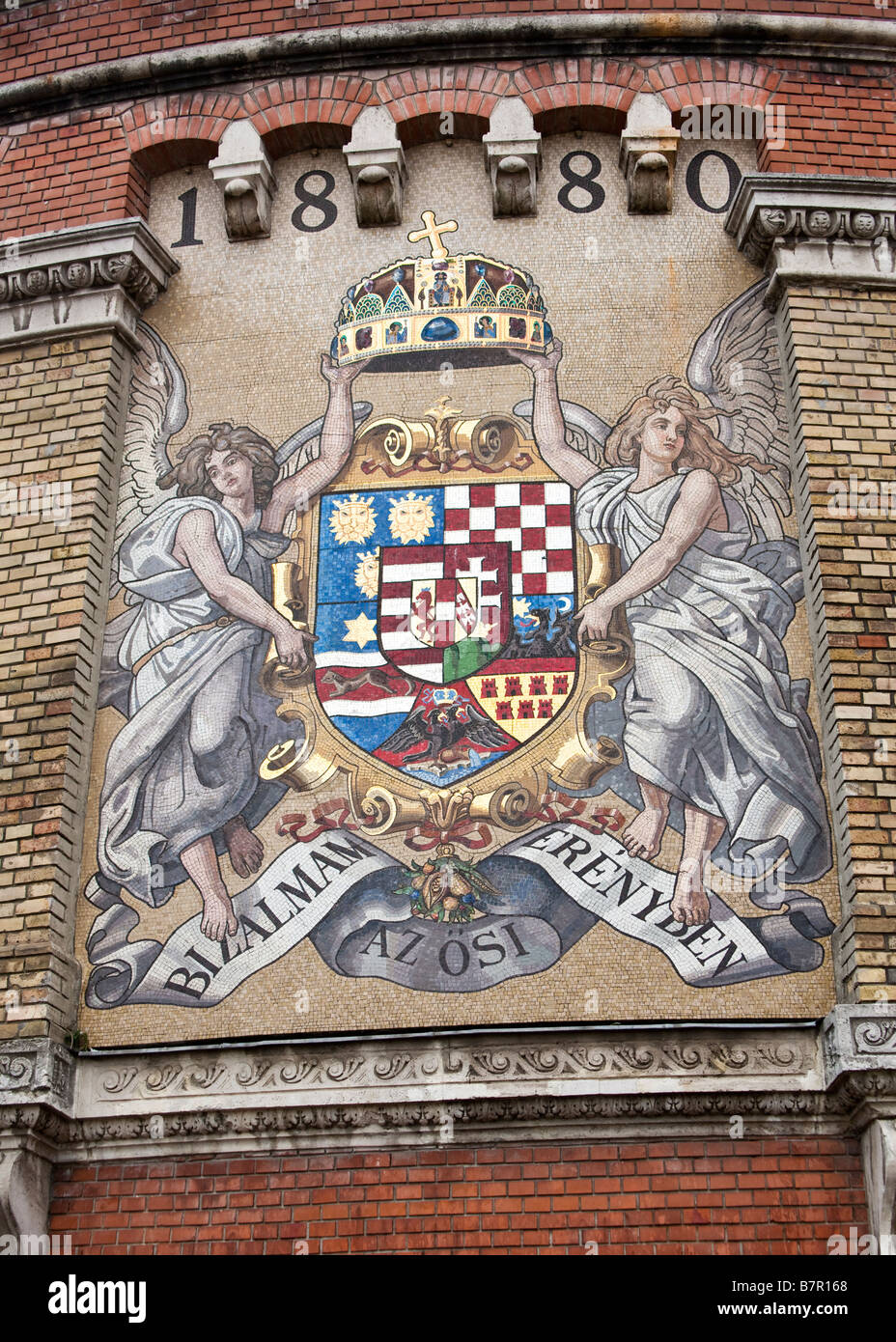 Wall mural of two angels holding a crown over a crest on Castle Hill ...