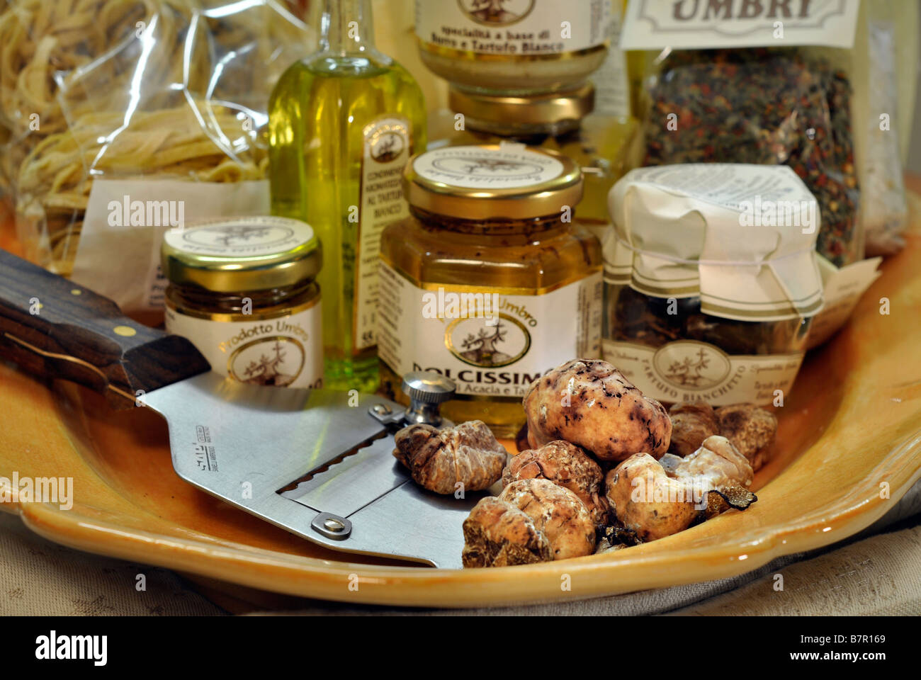 Fresh white truffles with Umbrian food products made with truffle ...
