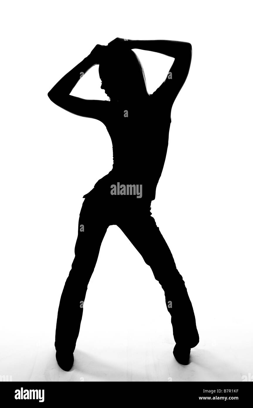 Young female model in a strong pose and form as a silhouette Stock ...