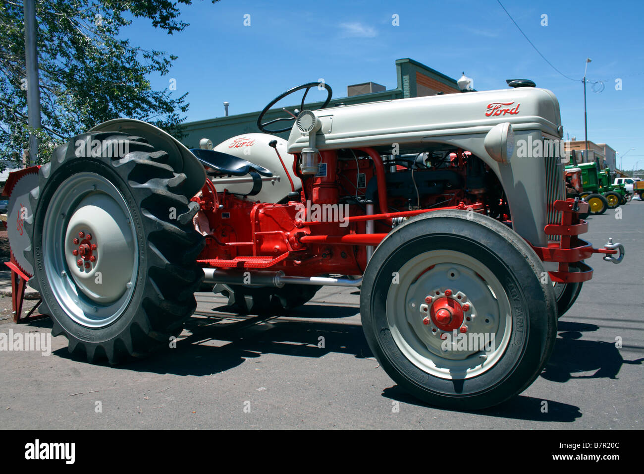 Early Ford motor company red and grey tractor, probably a restoration ...