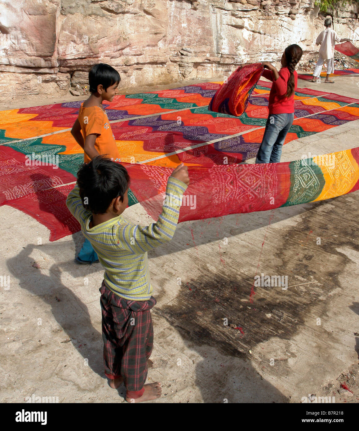 indian children with traditional textiles in the sun in the old city of ...