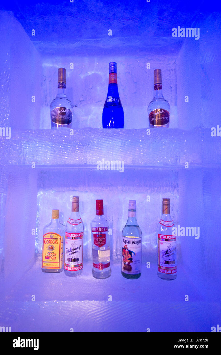 Detail of rows of alcohol bottles on ice shelves in the Ice Bar in ...