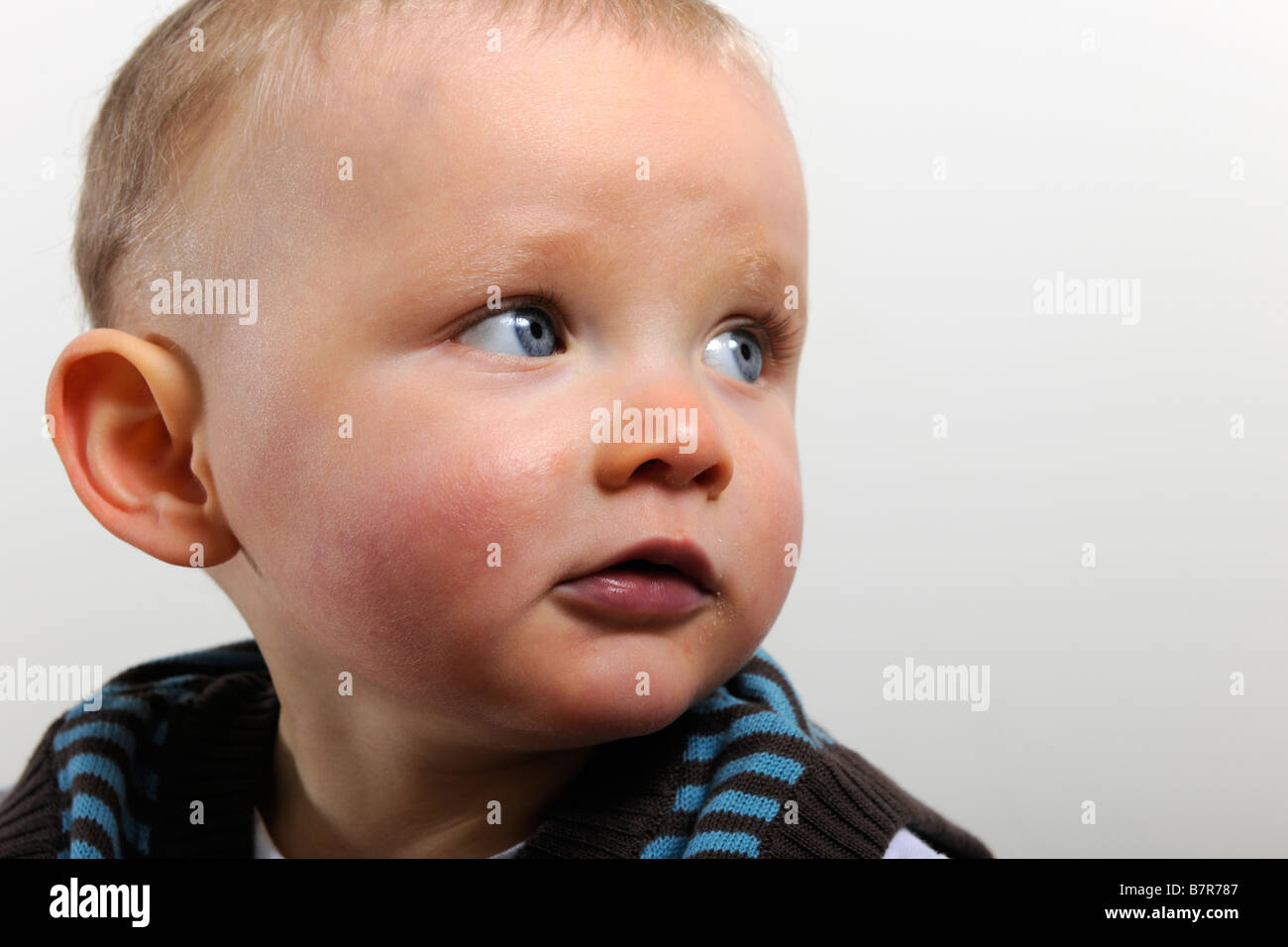 Young Boy looking to the right Stock Photo - Alamy