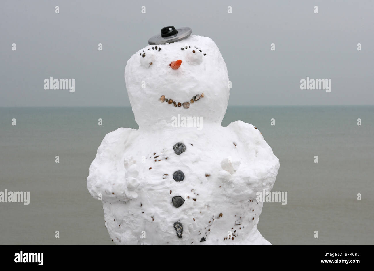 A snowman by the sea Stock Photo - Alamy