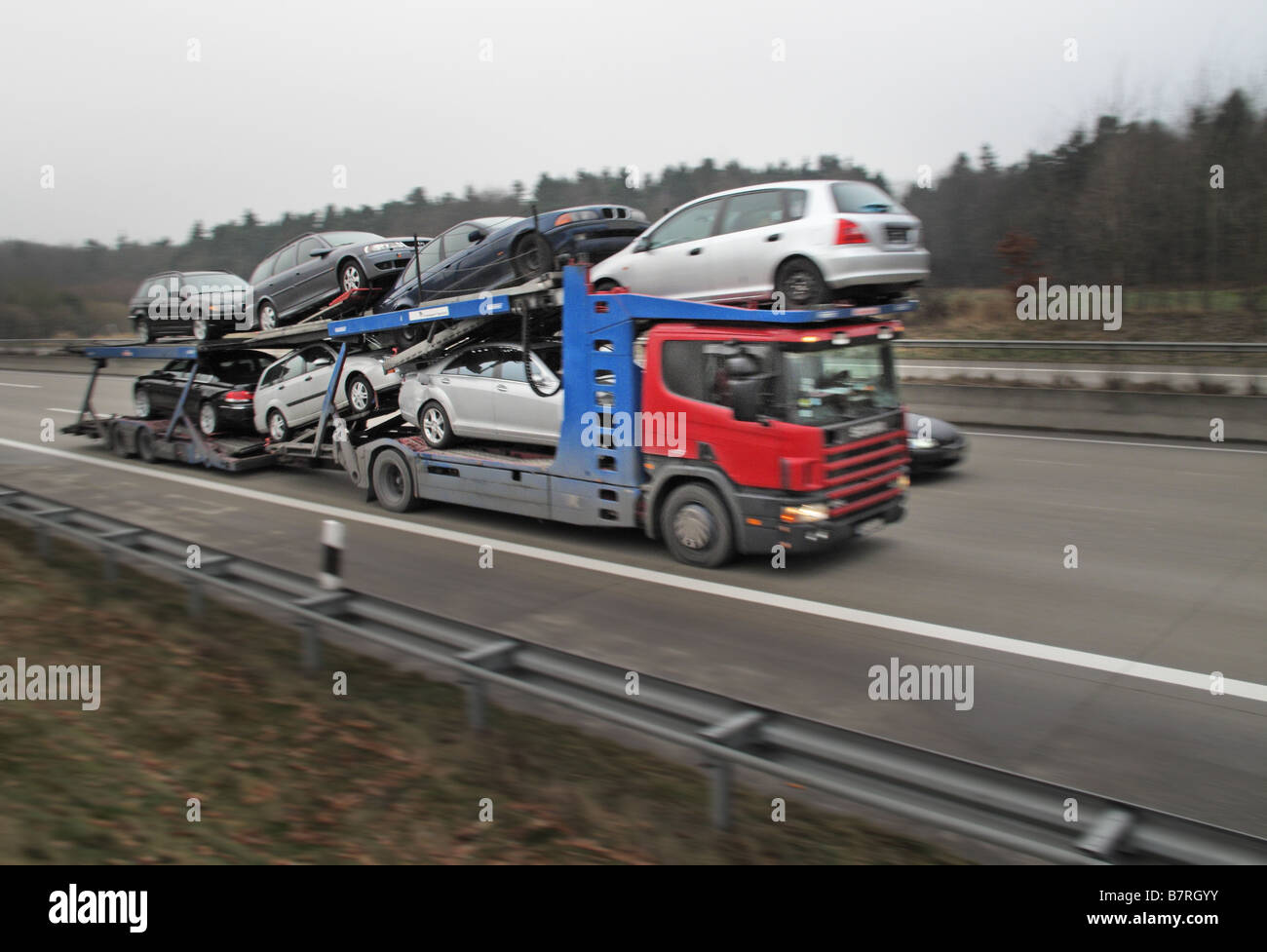 Truck loaded with cars Stock Photo - Alamy
