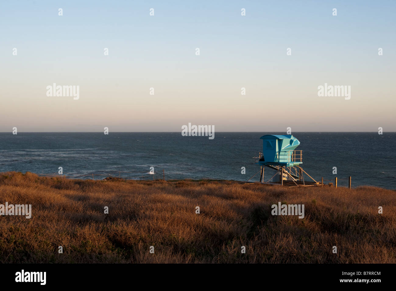 Blue Lifeguard tower along the coast Stock Photo - Alamy
