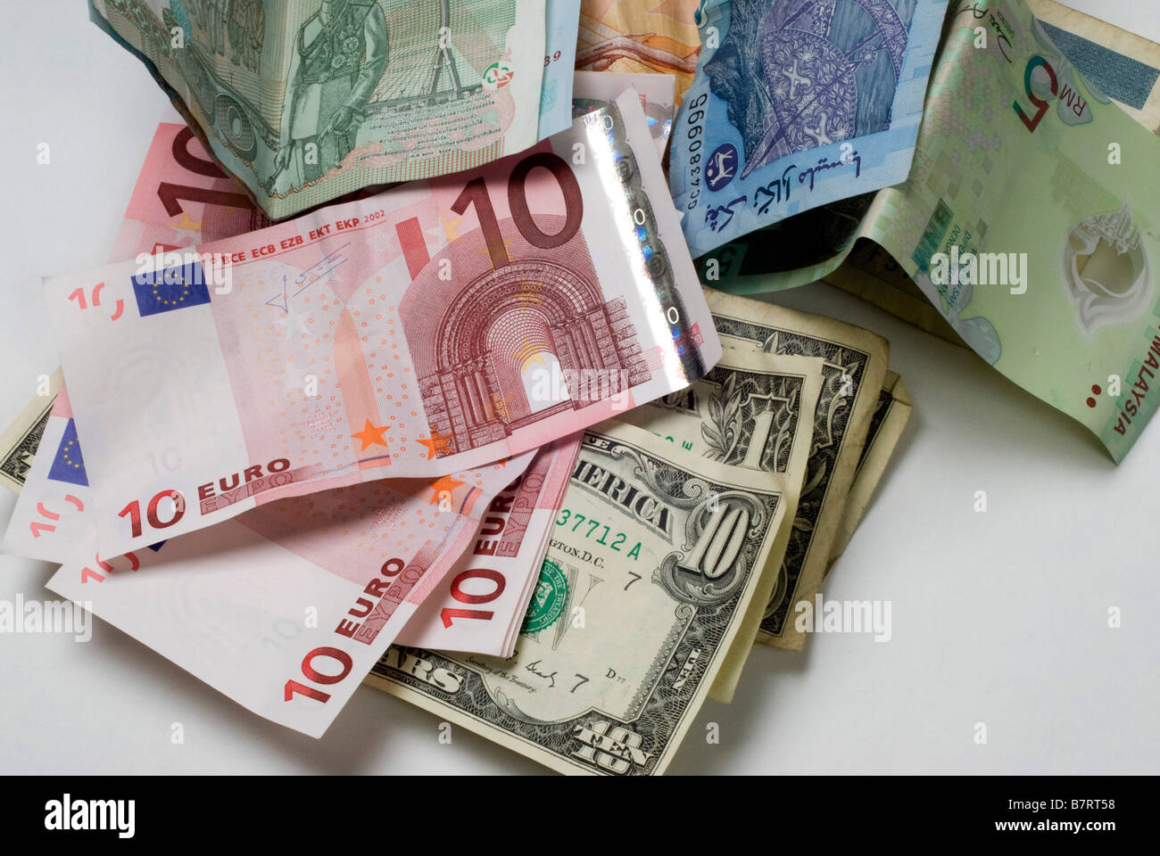 Assortment of International currency Stock Photo - Alamy