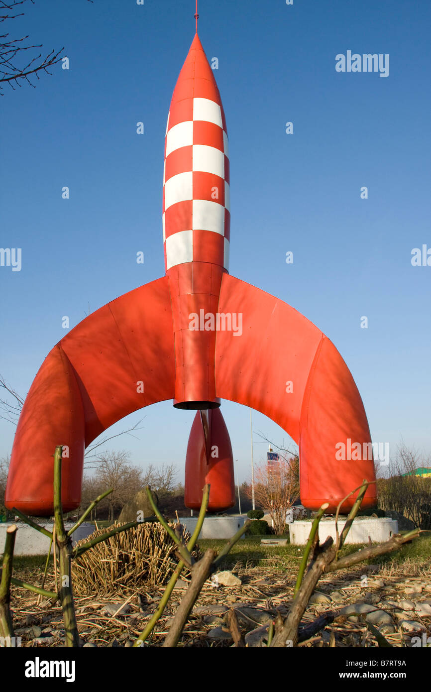 Red and white rocket model. blue sky. Hergé Tintin story. moon landing ...