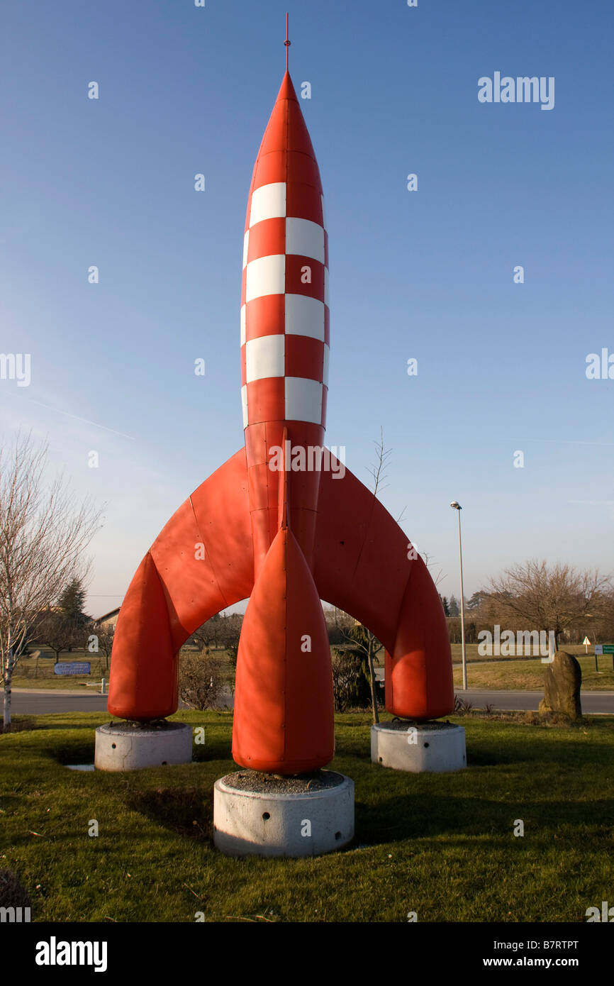 Red and white rocket model. blue sky. Hergé Tintin story. moon landing ...